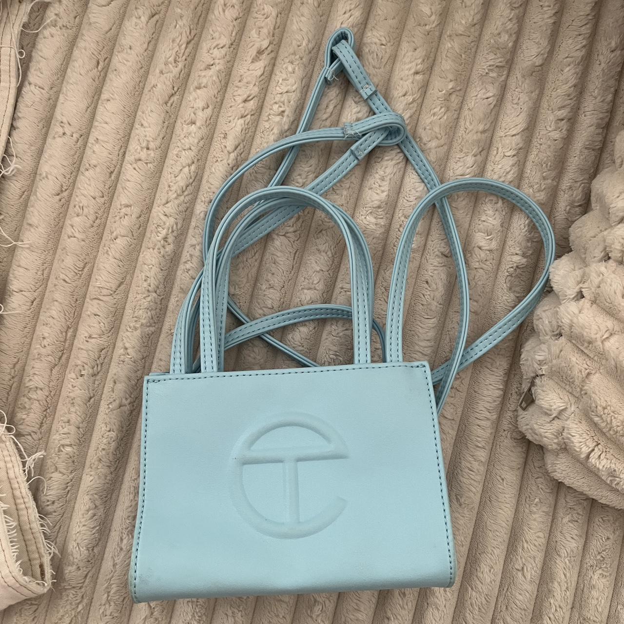 Mini baby blue telfar bag. Dog chewed the straps and... - Depop