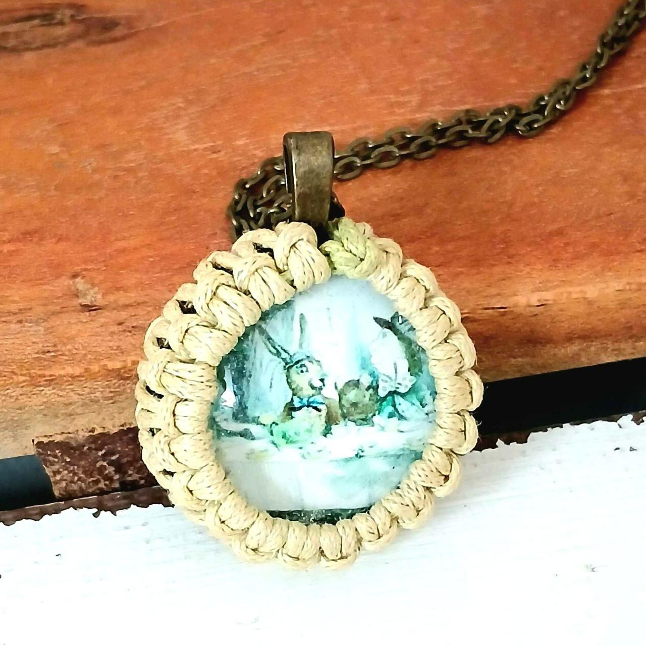 Macrame alice & wonderland pendant necklace Bronze... - Depop