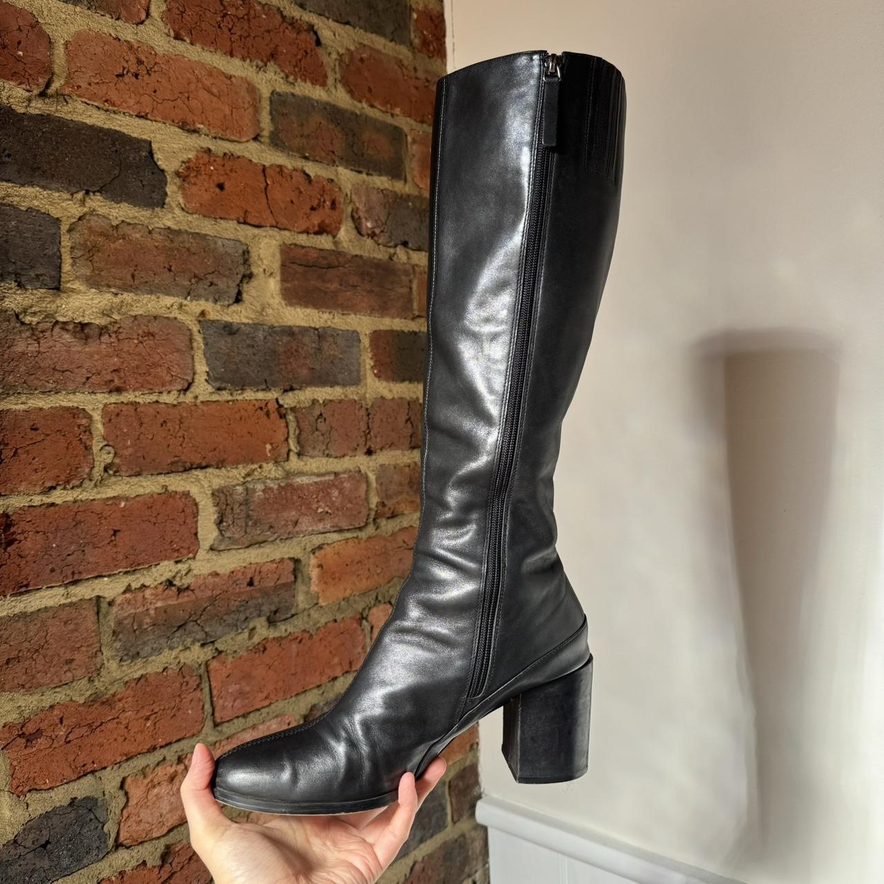 Classic knee high black leather boots by EOS... - Depop