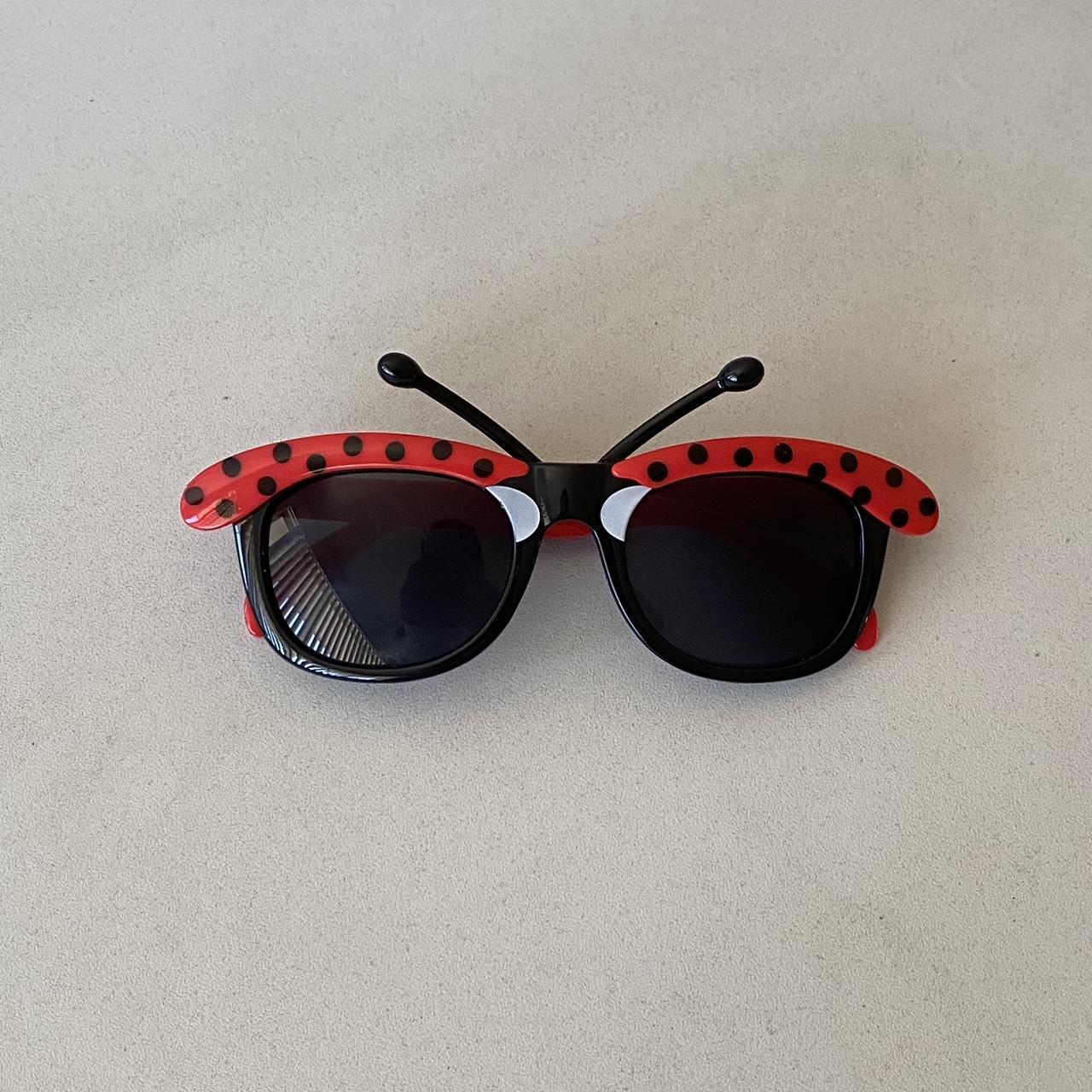 Ladybug sunglasses with black frames and red and... - Depop