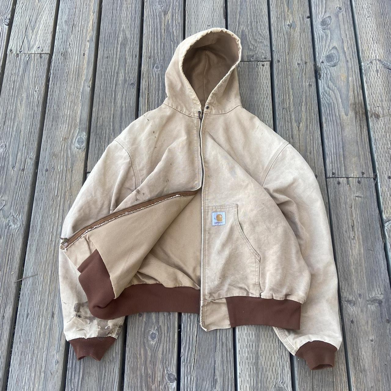 Carhartt tan hooded jacket Essential piece for the... - Depop