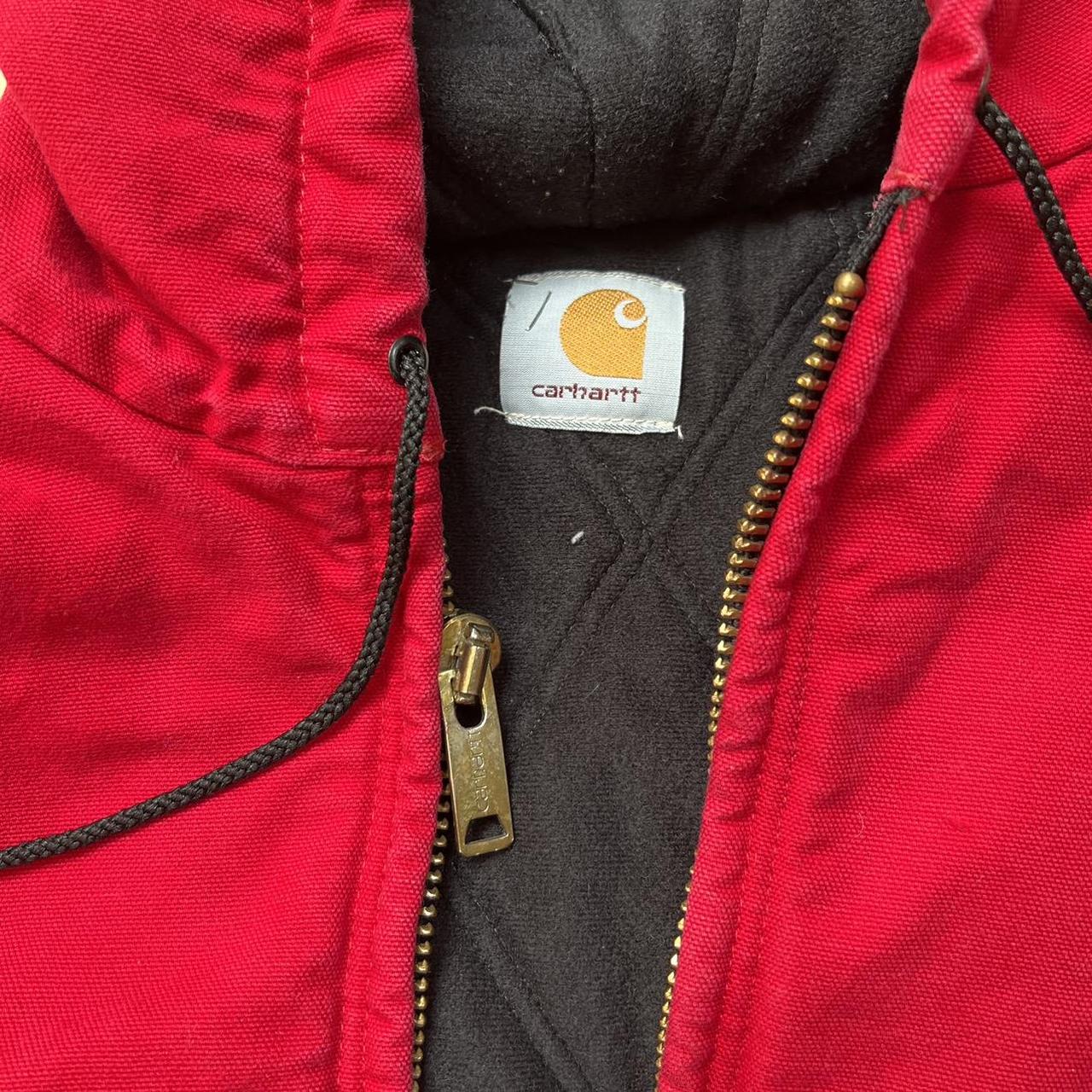 Red Carhartt hooded work jacket No size but fits... - Depop