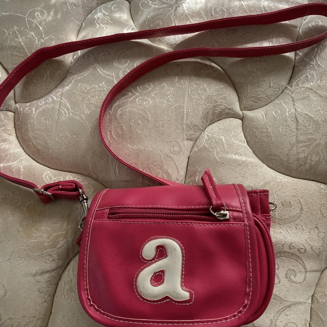 Very cute “A” mini pink purse #lettera #purse... - Depop