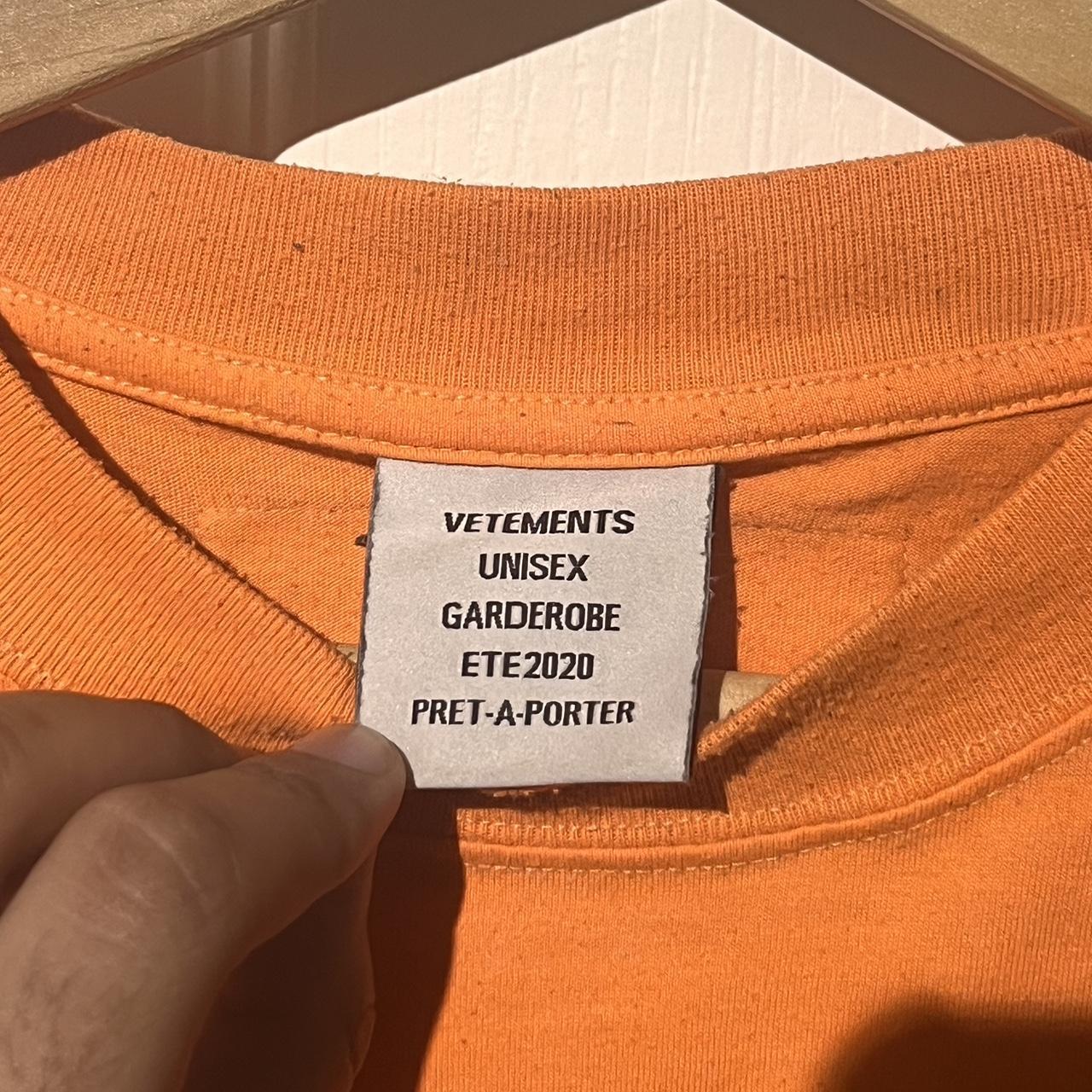 vetements tshirt shipping tag on back #vetements... - Depop