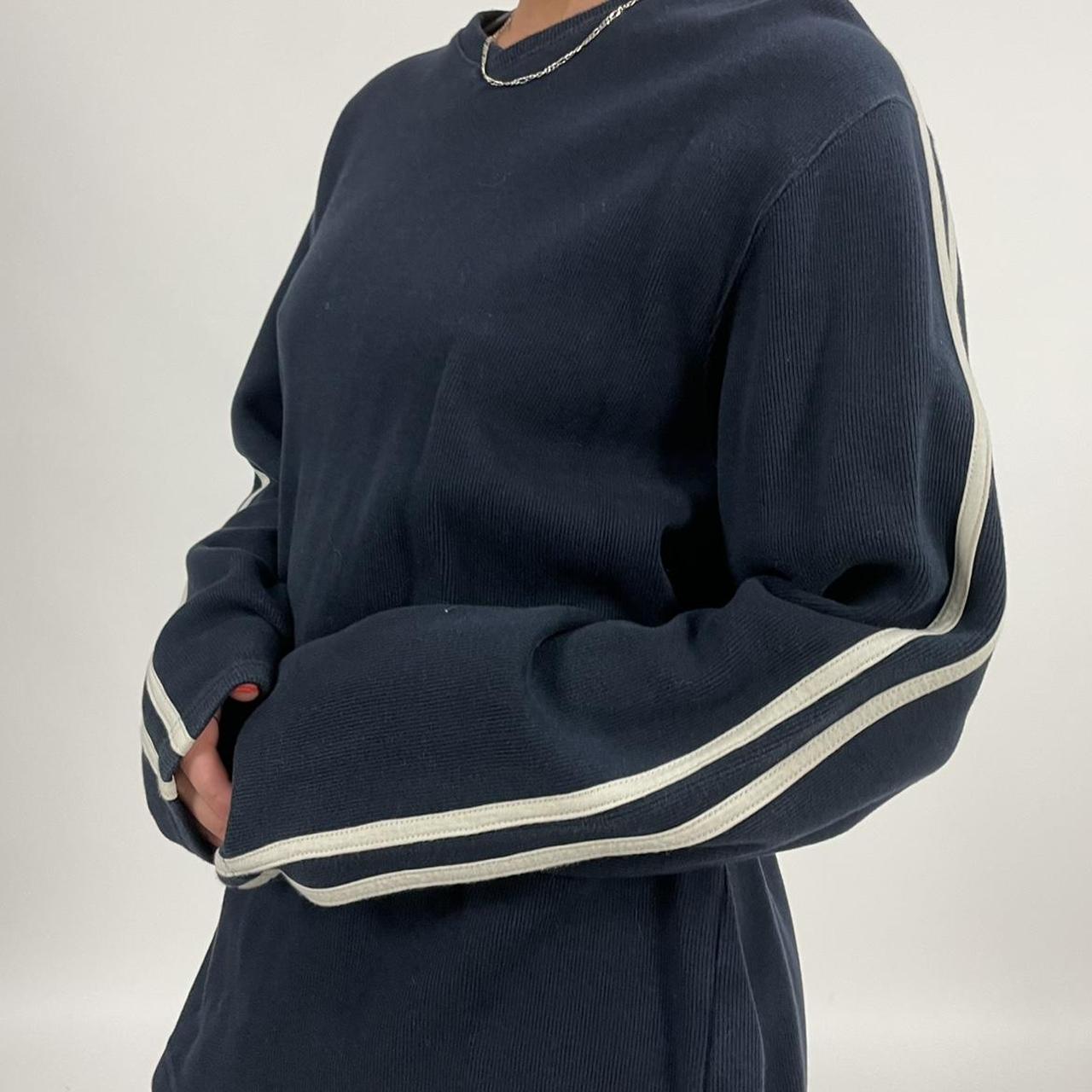 Baggy navy blue jumper from the 90s. Seen on size 8 - Depop