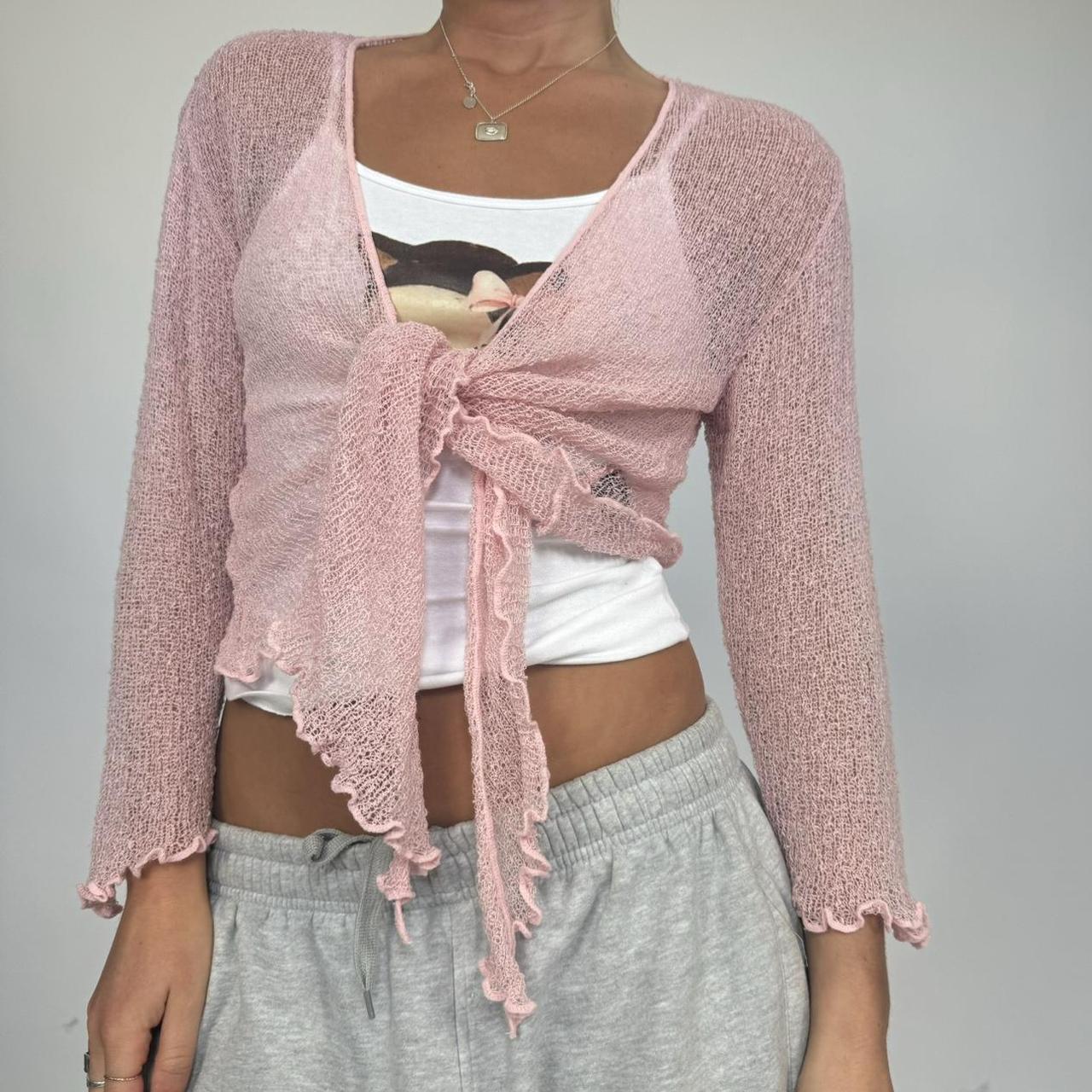 Pink crochet cardigan with ruffle trim and tie front... - Depop