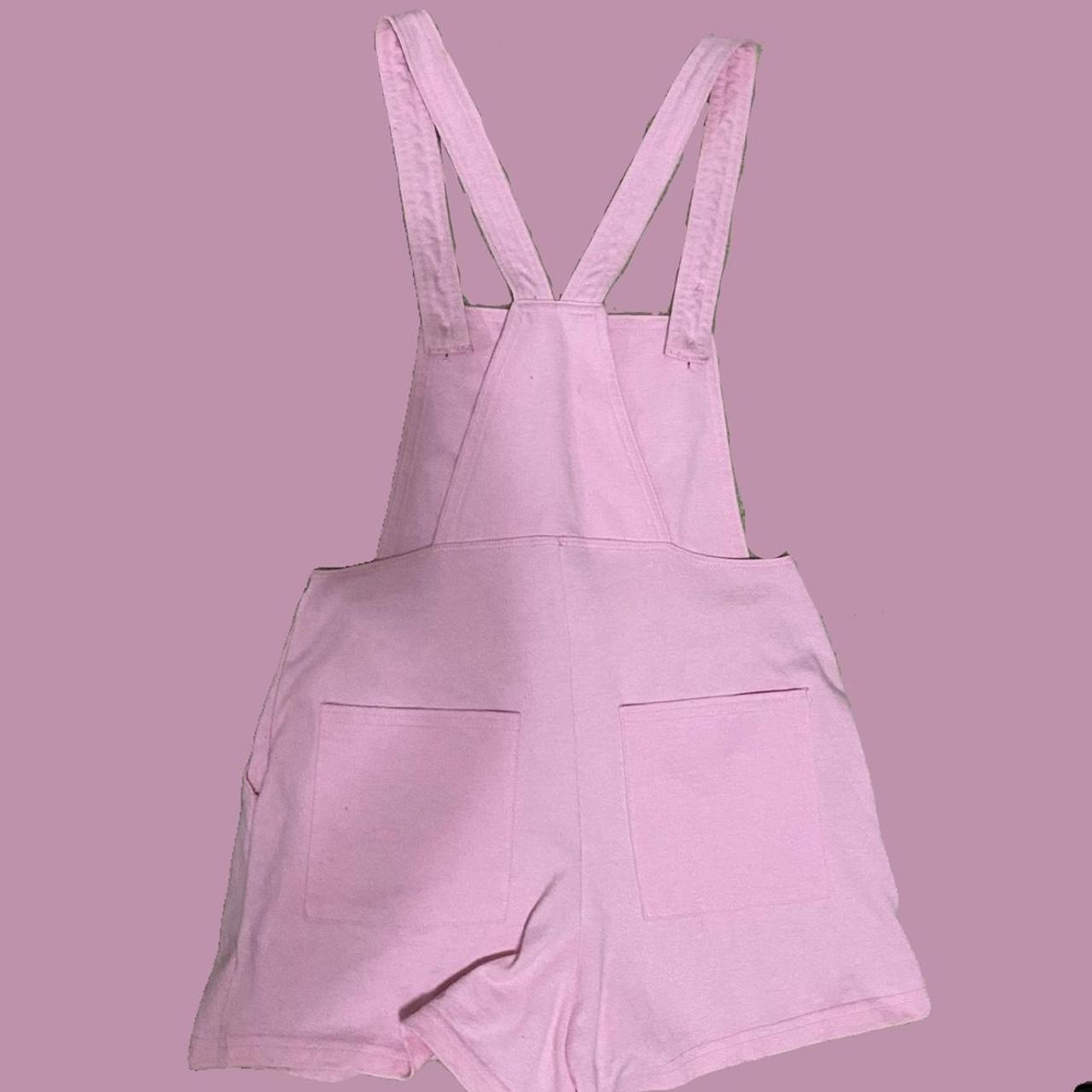 The cutest baby pink overall shorts with blue... - Depop