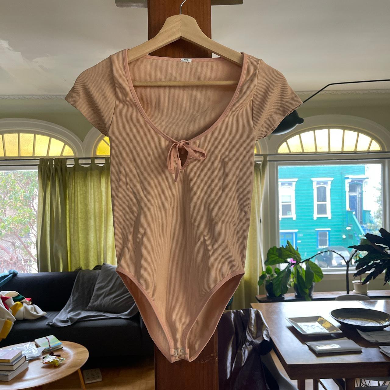 Pale pink vintage bodysuit with free shipping - Depop