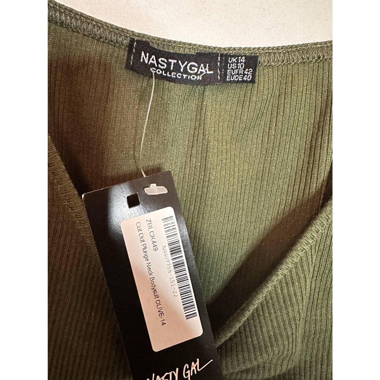 From Nasty Gal Cut Out Plunge Neck Bodysuit ‣ Depop