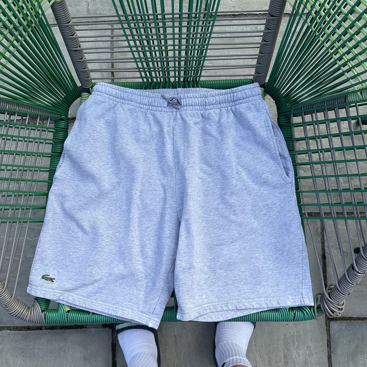 Grey and white Lacoste shorts - Depop