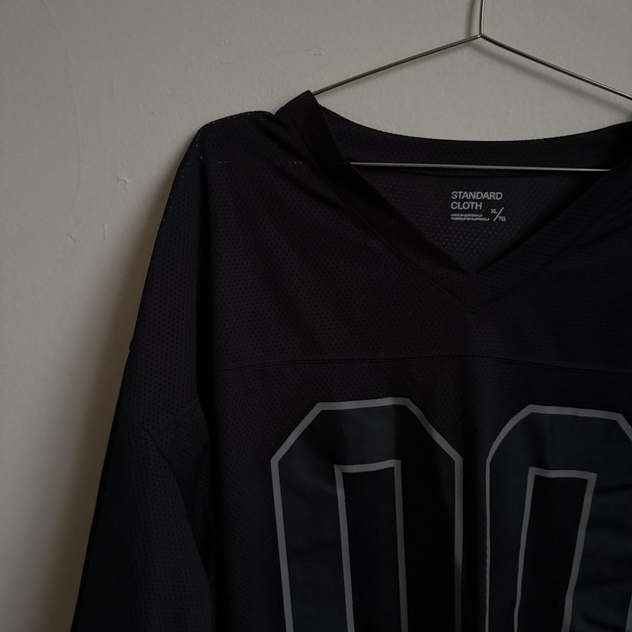 UO Standard Cloth oversized football jersey in... - Depop