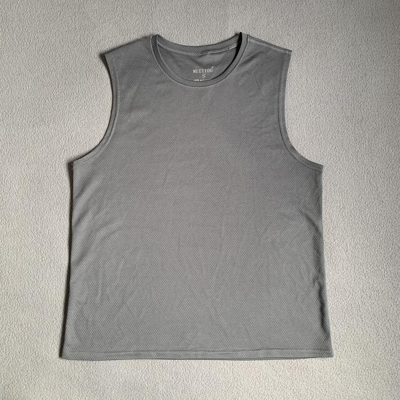 Lightweight polyester sports base layer tank top... - Depop