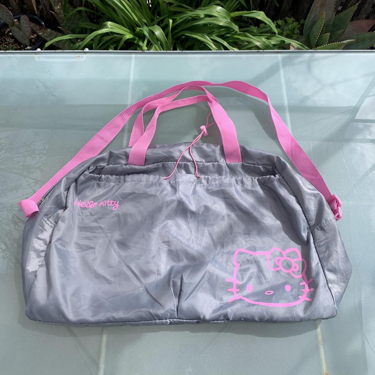 Pink and grey hello kitty duffel bag. Super spacious... - Depop