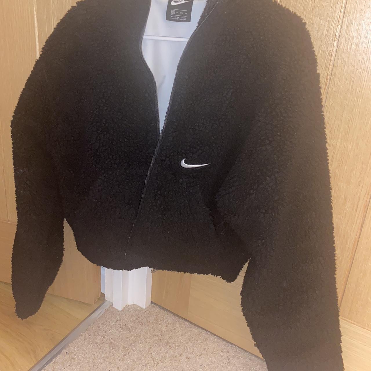 Black Nike fluffy slightly cropped and looser fit... - Depop