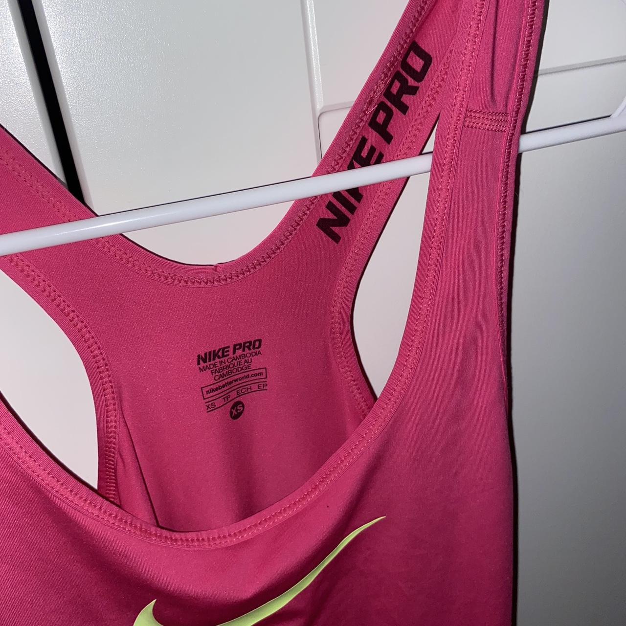 Nike pro pink sports vest with bright yellow Nike... - Depop