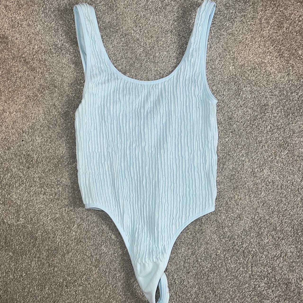 Baby blue thong bodysuit from Forever 21 , brought... - Depop