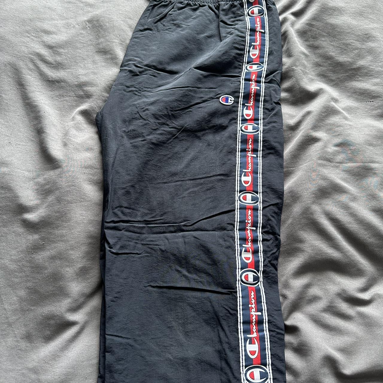 Champion track pants navy - Depop