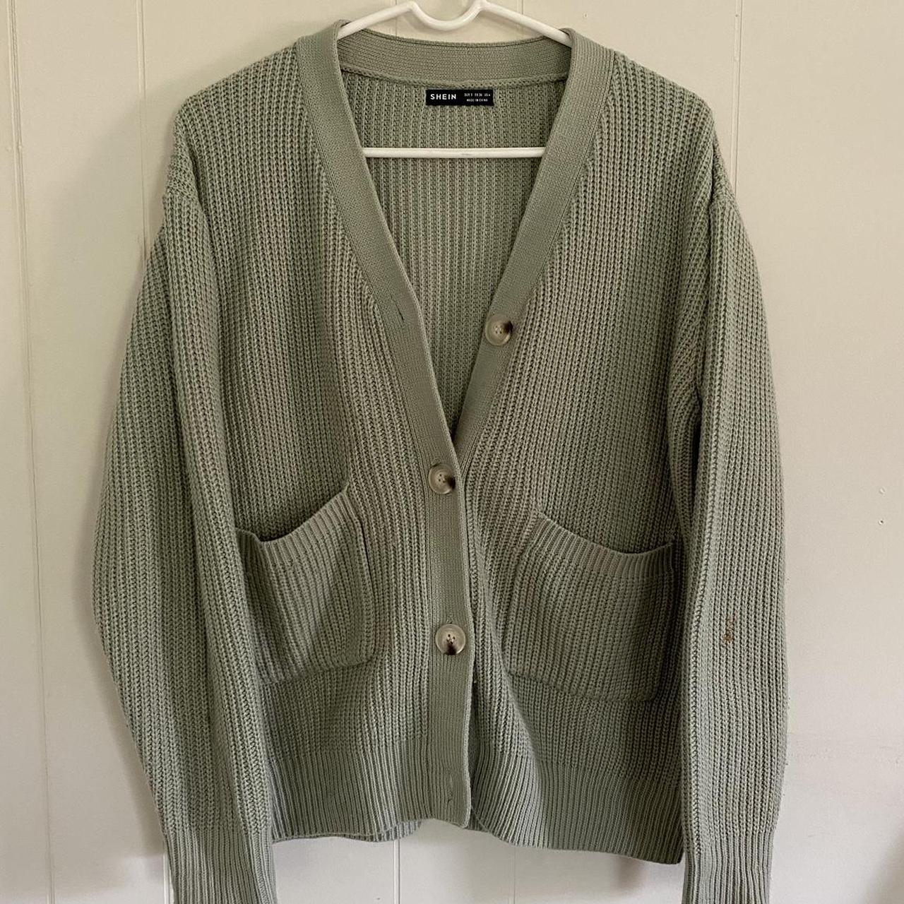 sage green chunky cardigan has a bit of acrylic... - Depop