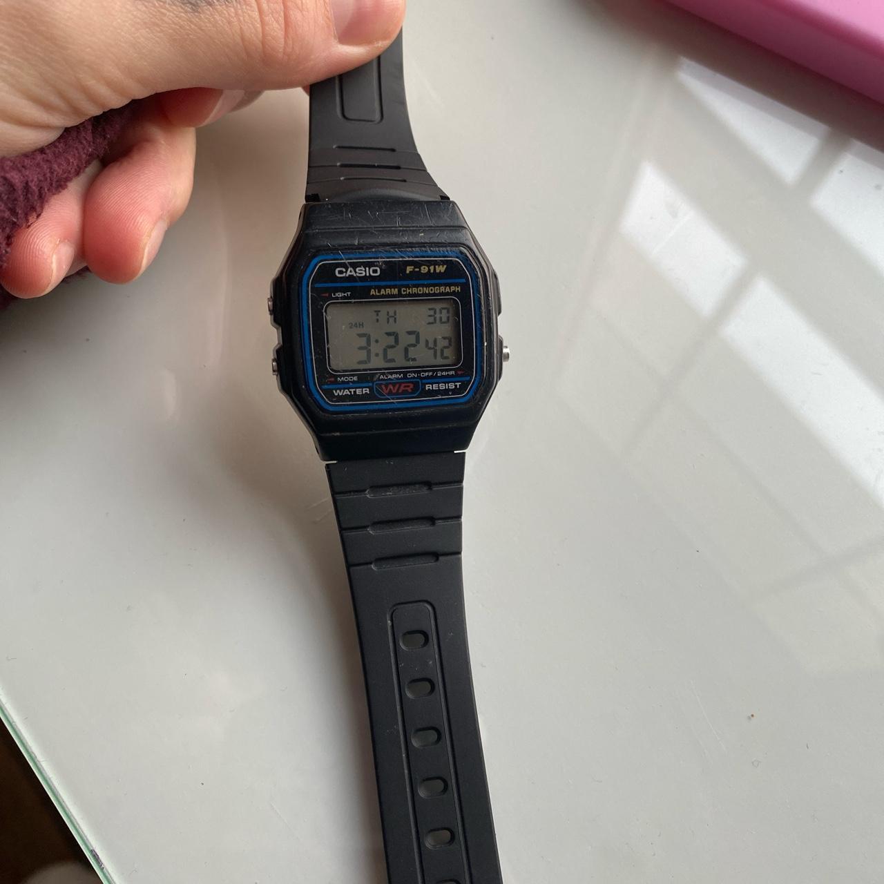 Black Casio watch worn, scratched surface but only... - Depop
