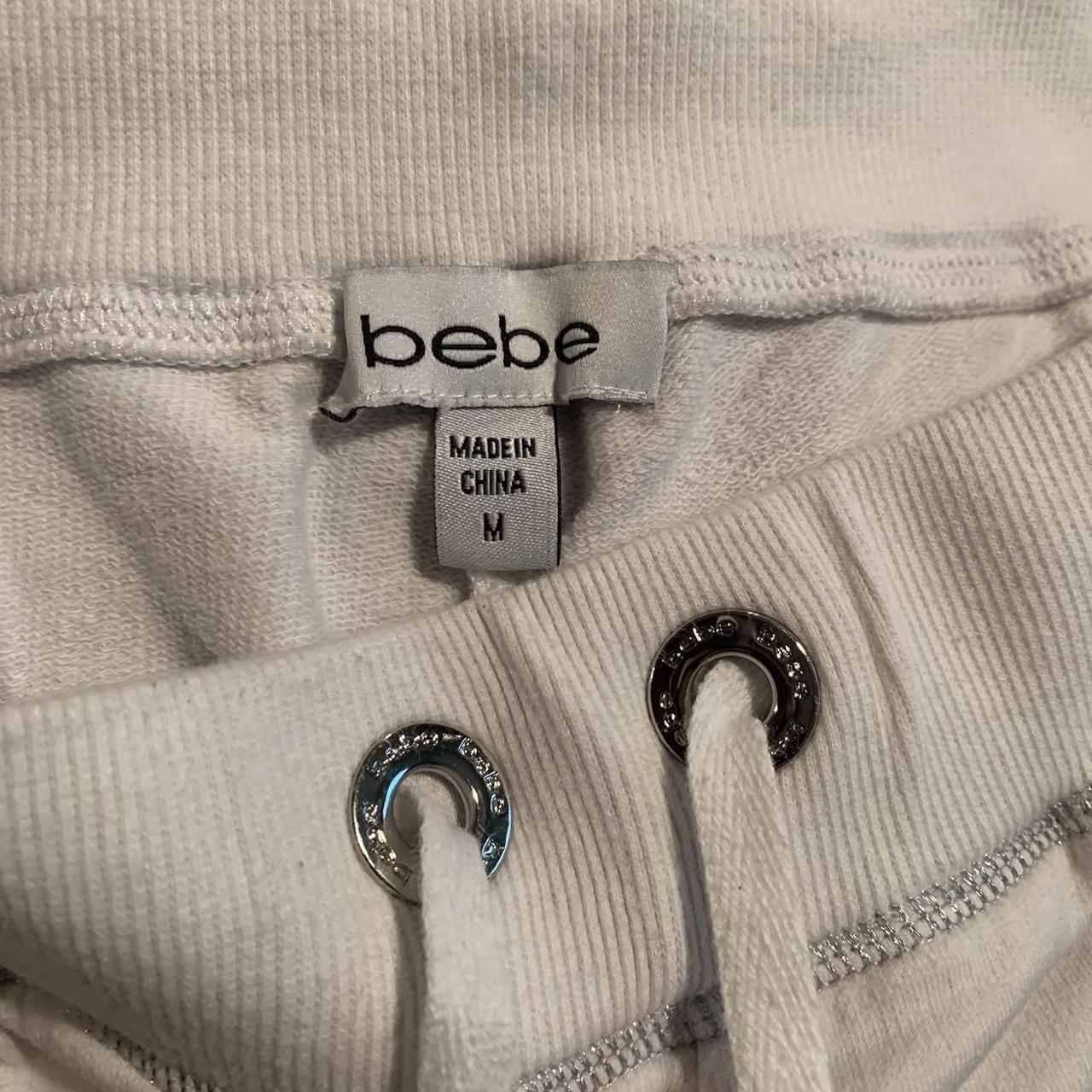 y2k BEBE sweatpants with butt print. Has gems on... - Depop