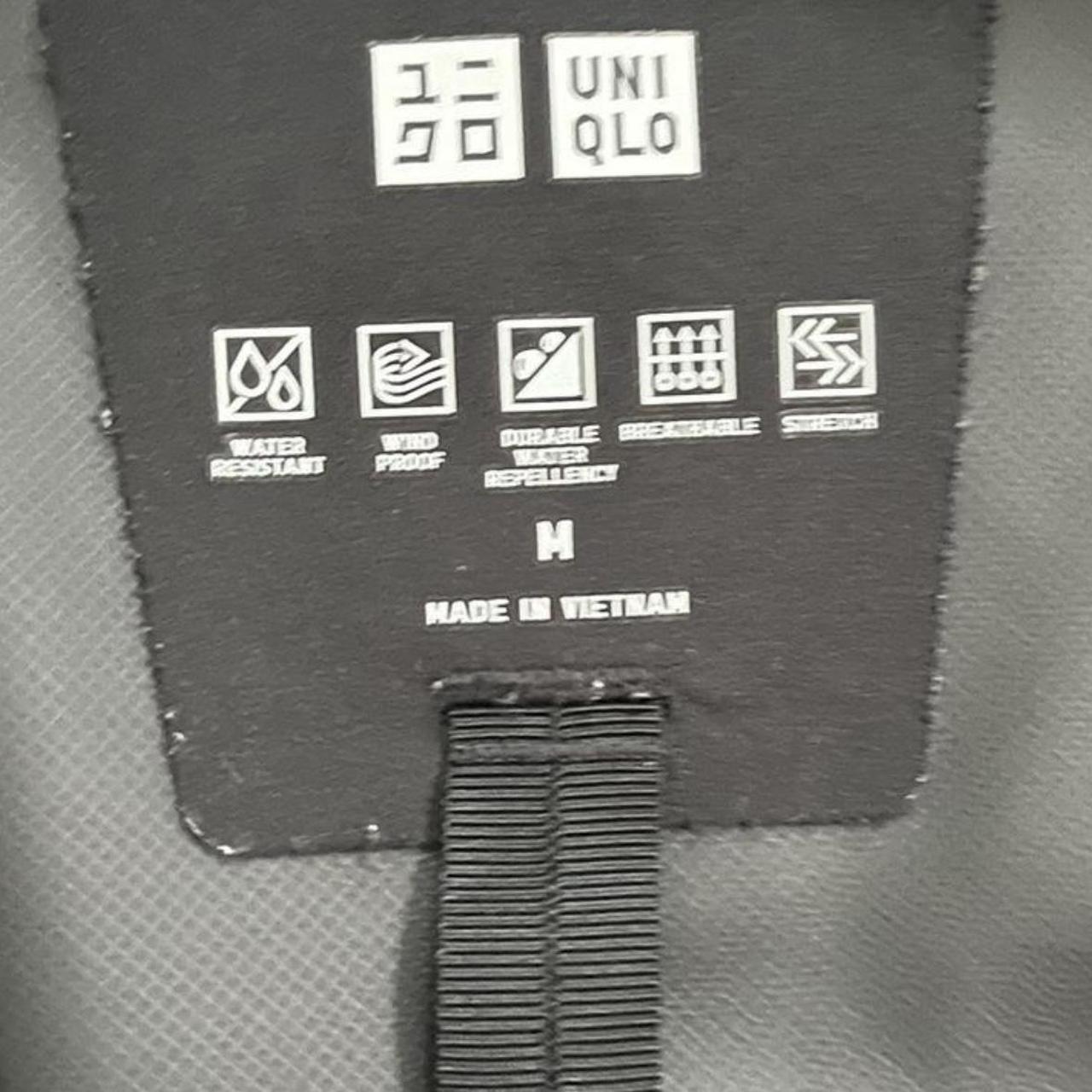 Uniqlo bloc tech water proof black coat Tag states... - Depop