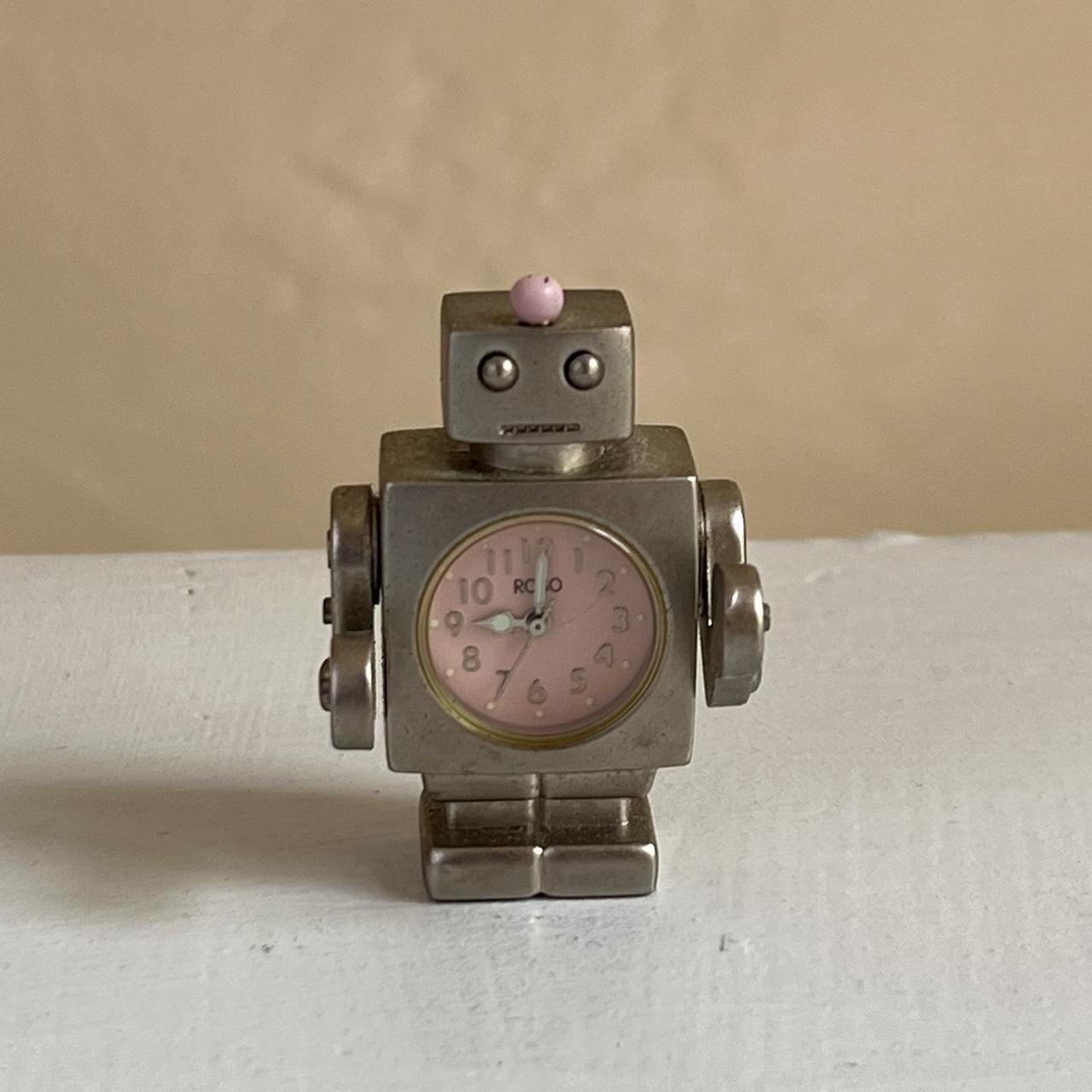 Mini cute metal robo clock Poseable arms, pink and... - Depop