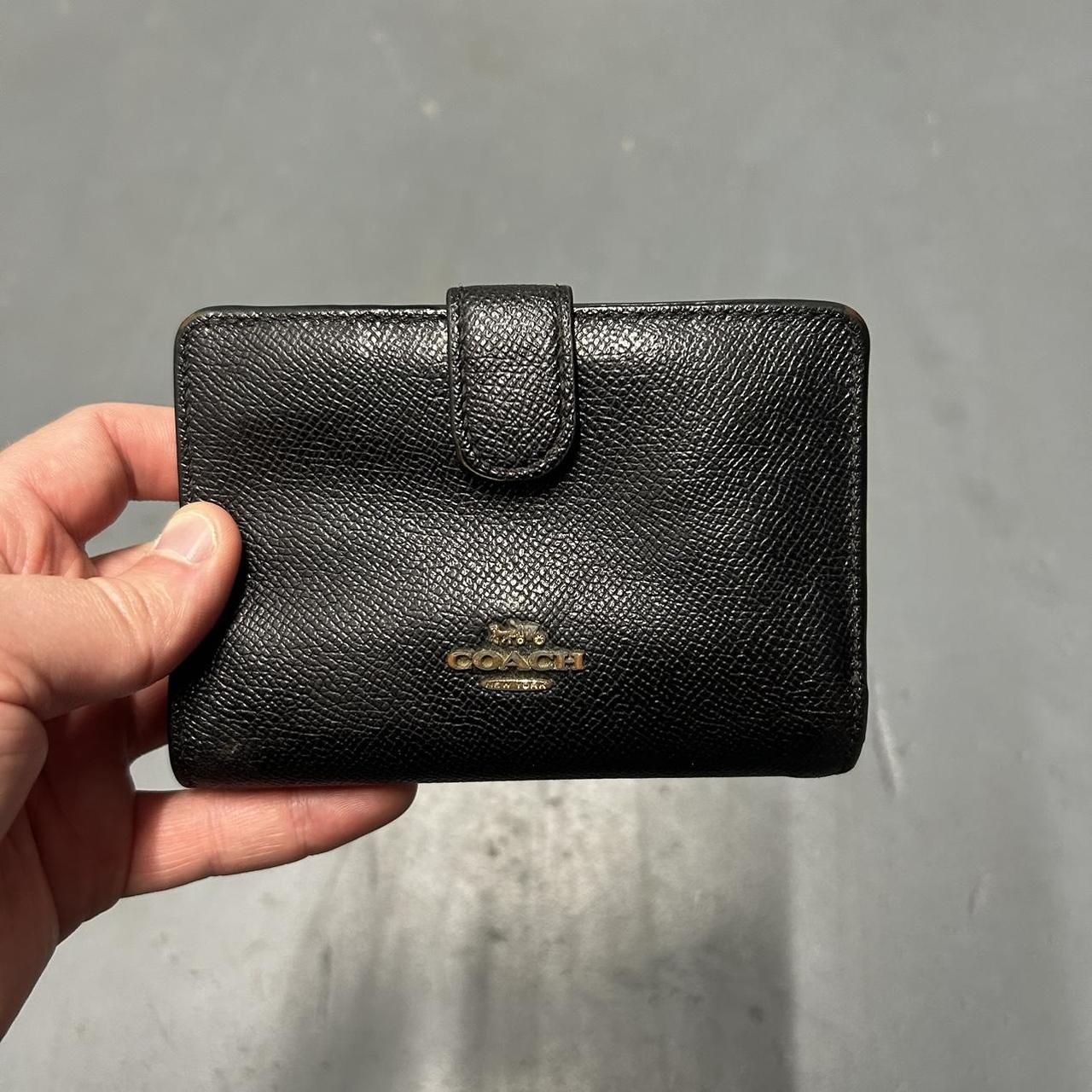 Coach black bifold leather wallet with snap clasp... | Depop