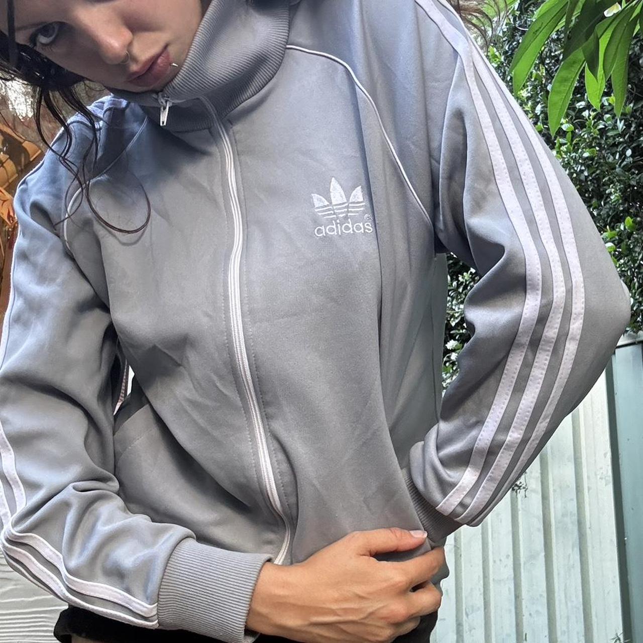 a timeless staple Grey Adidas tracksuit top with... - Depop