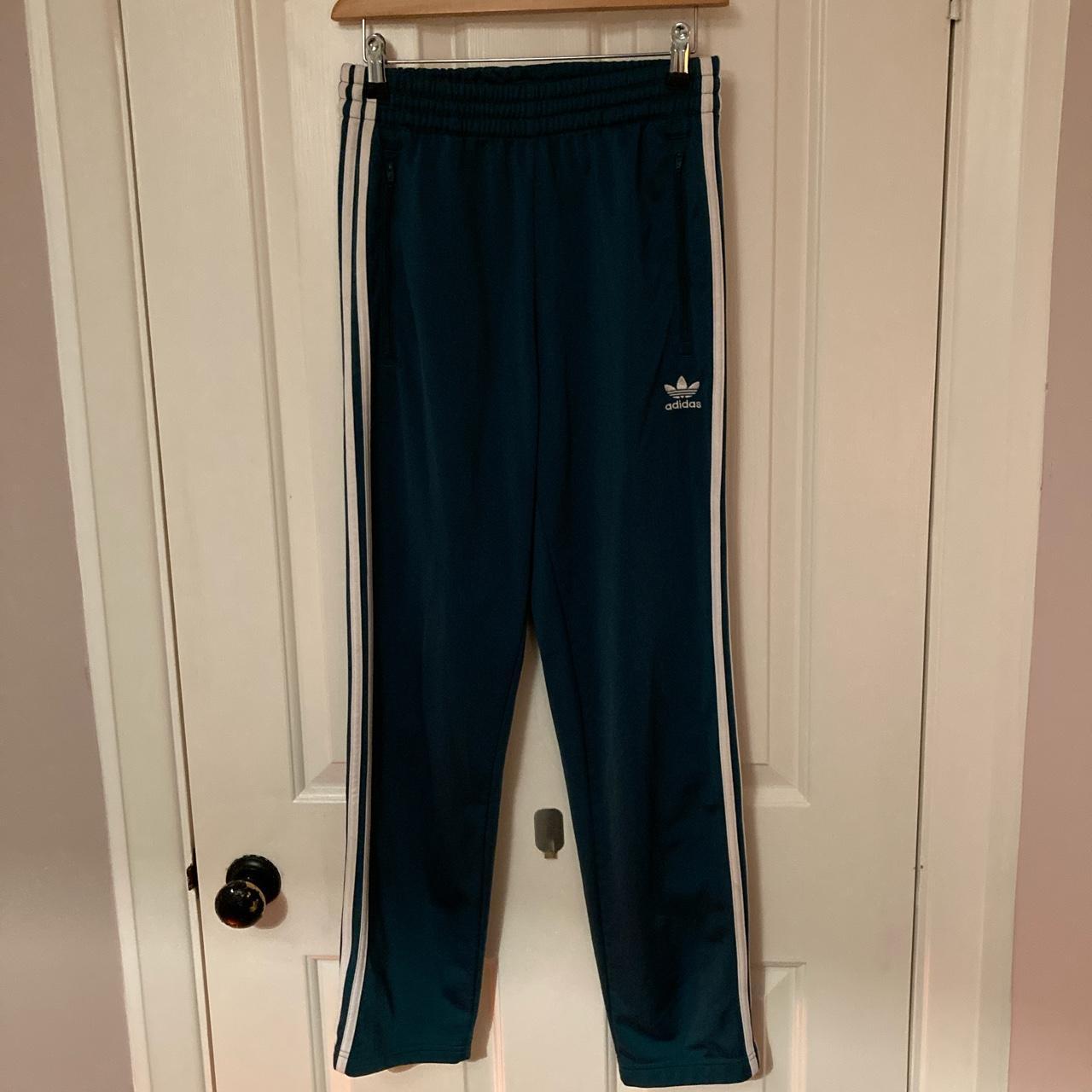 Green adidas sweatpants with leg zip. - Depop