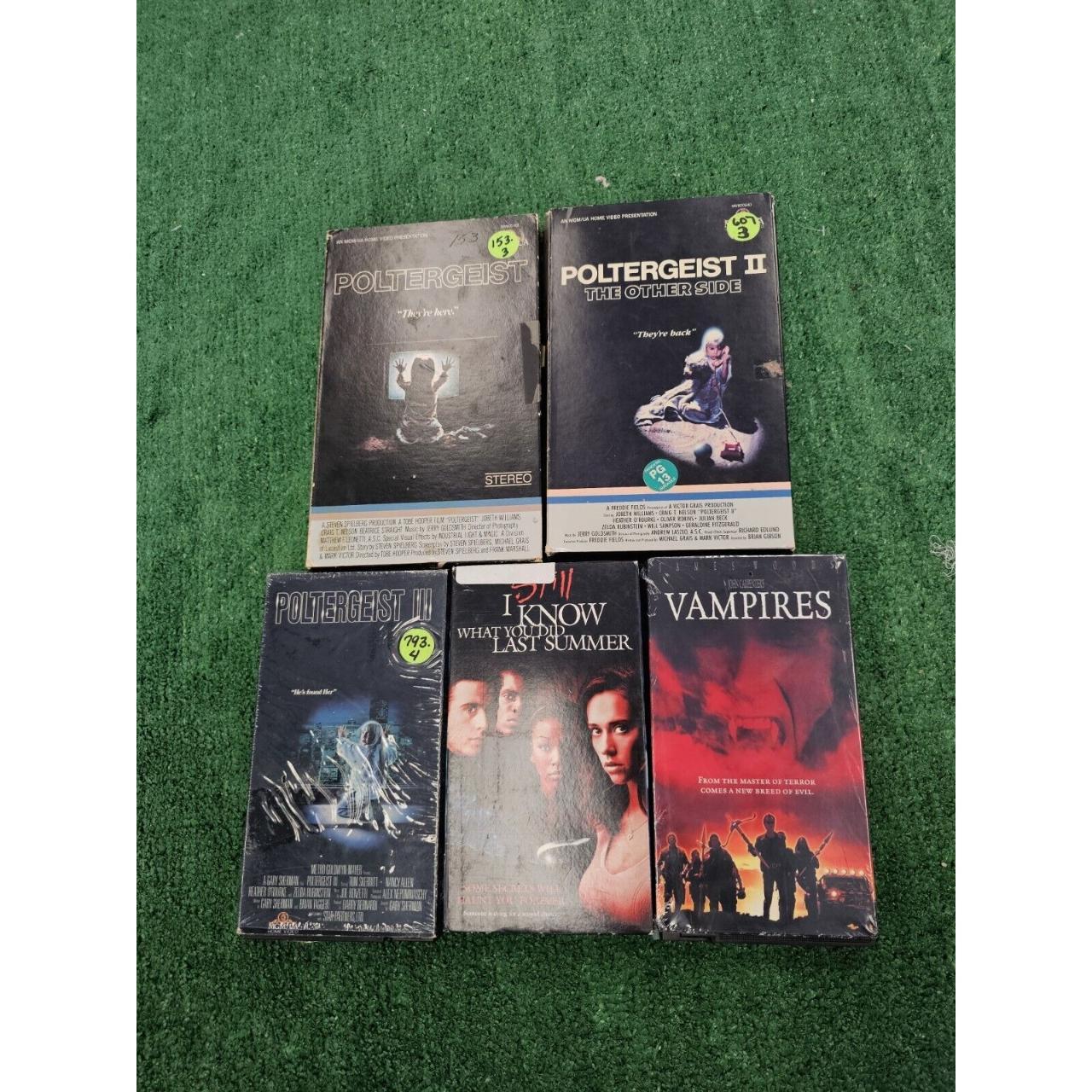 This Poltergeist VHS lot includes the classic horror... - Depop