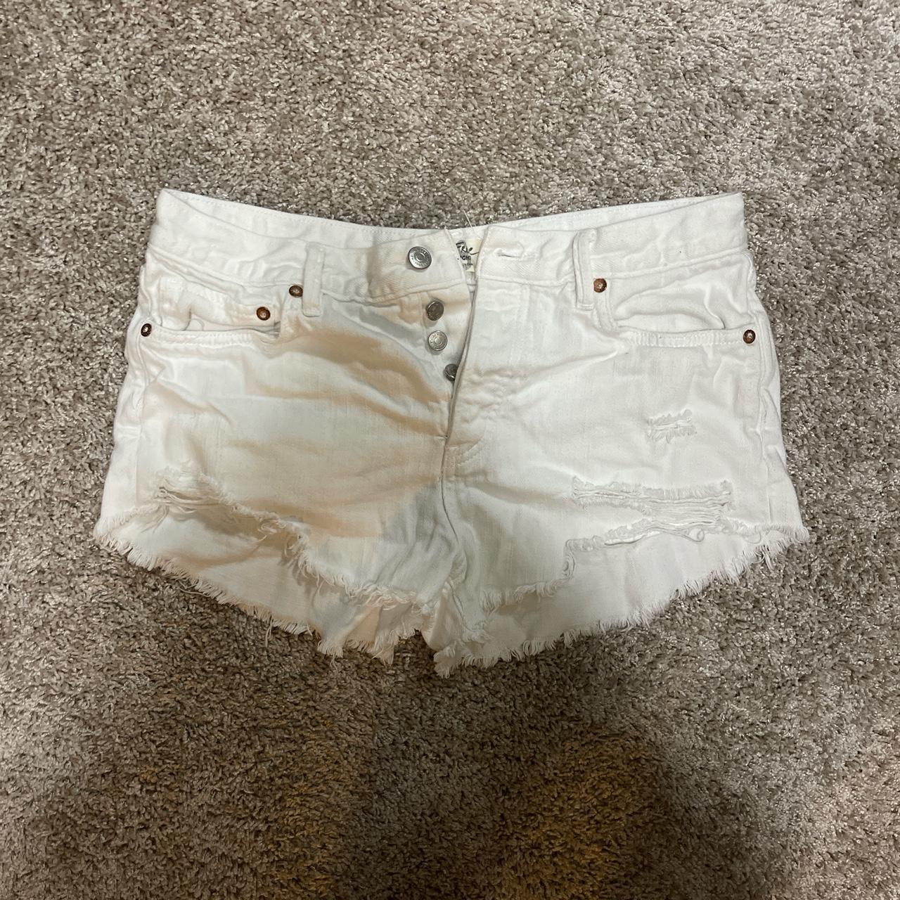white, distressed denim shorts as shown with no... - Depop
