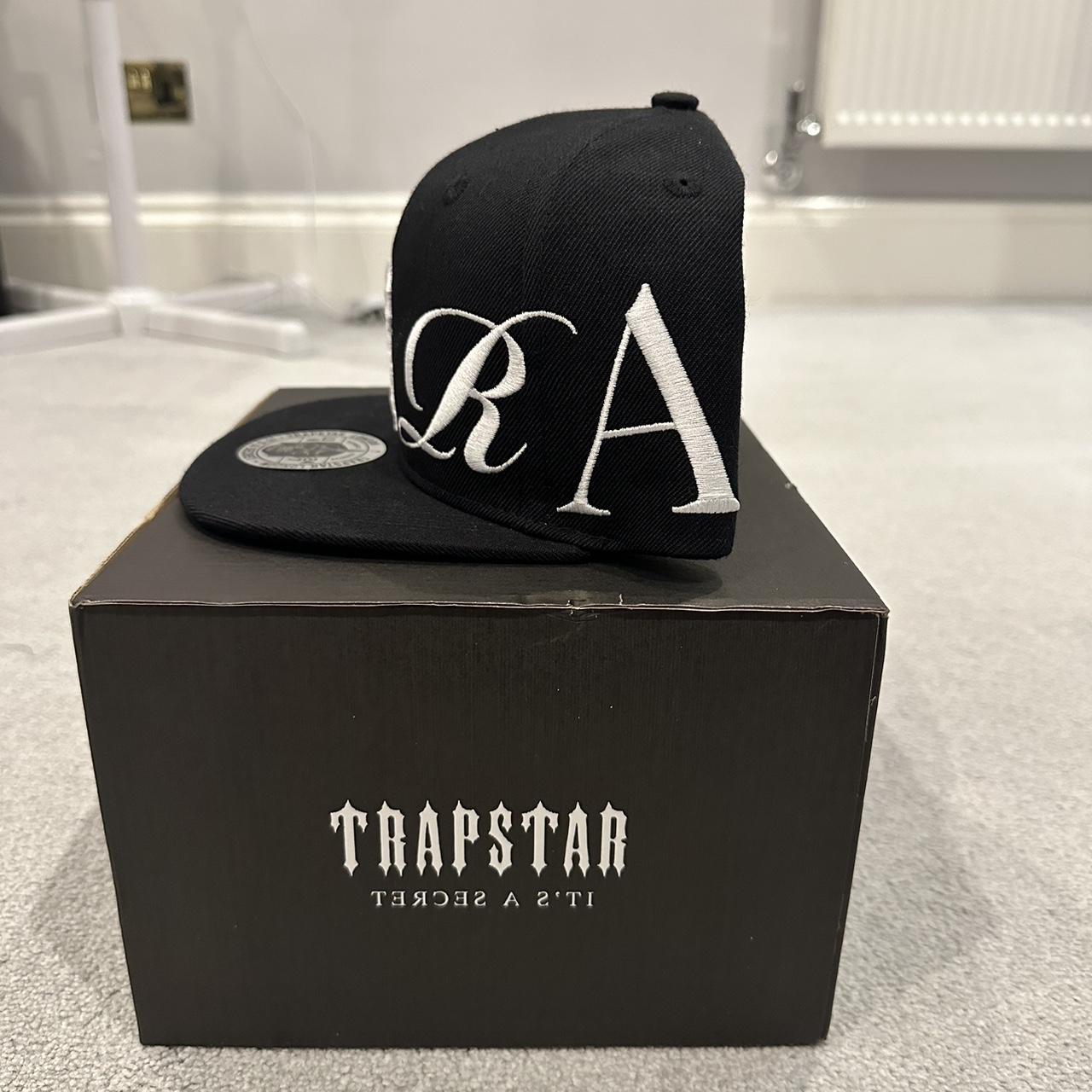 This is a brand new Trapstar SnapBack. With box.... - Depop