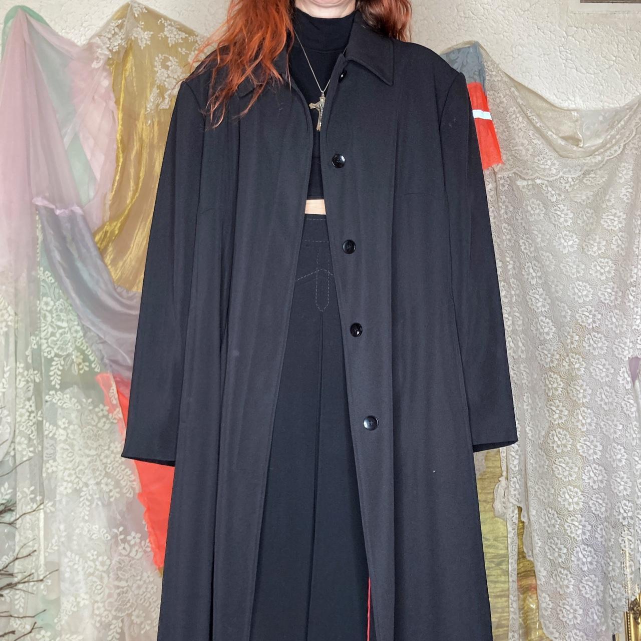 long black duster with an elegant minimal design and... - Depop
