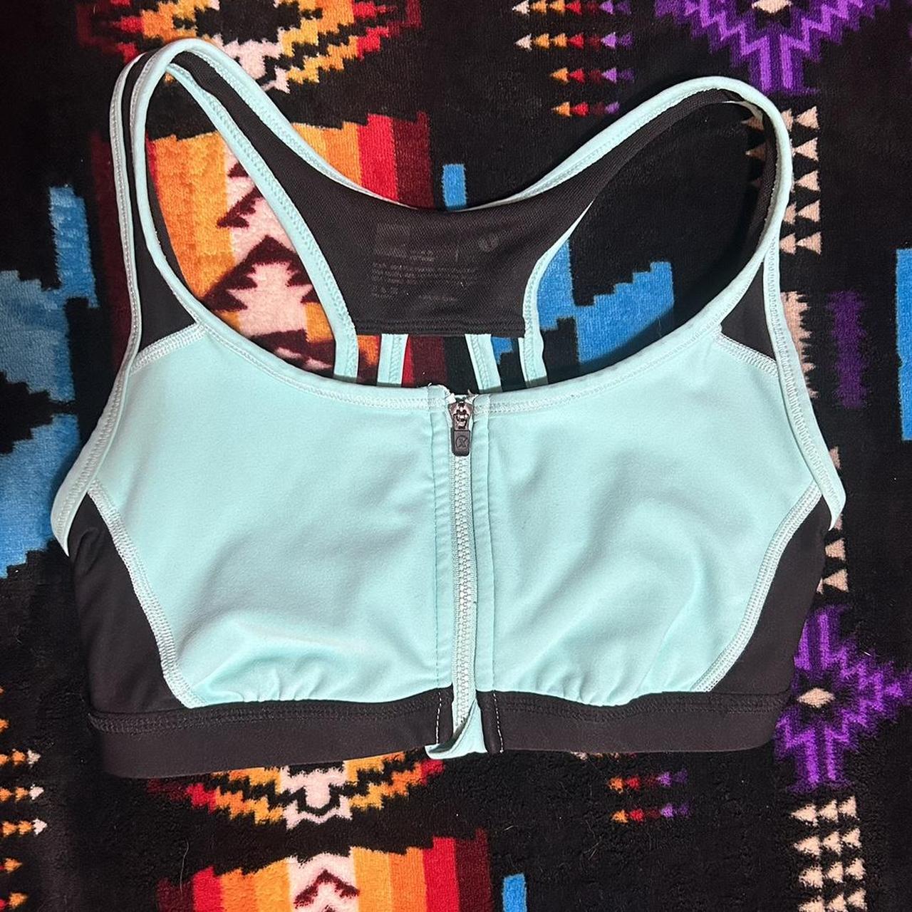 Xersion Women's Blue and Black Bra | Depop