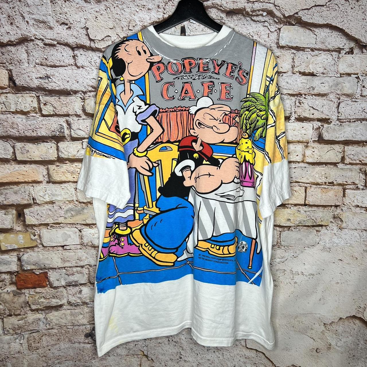 Vintage Popeyes Cafe 1994 All Over Print AOP T Shirt... - Depop