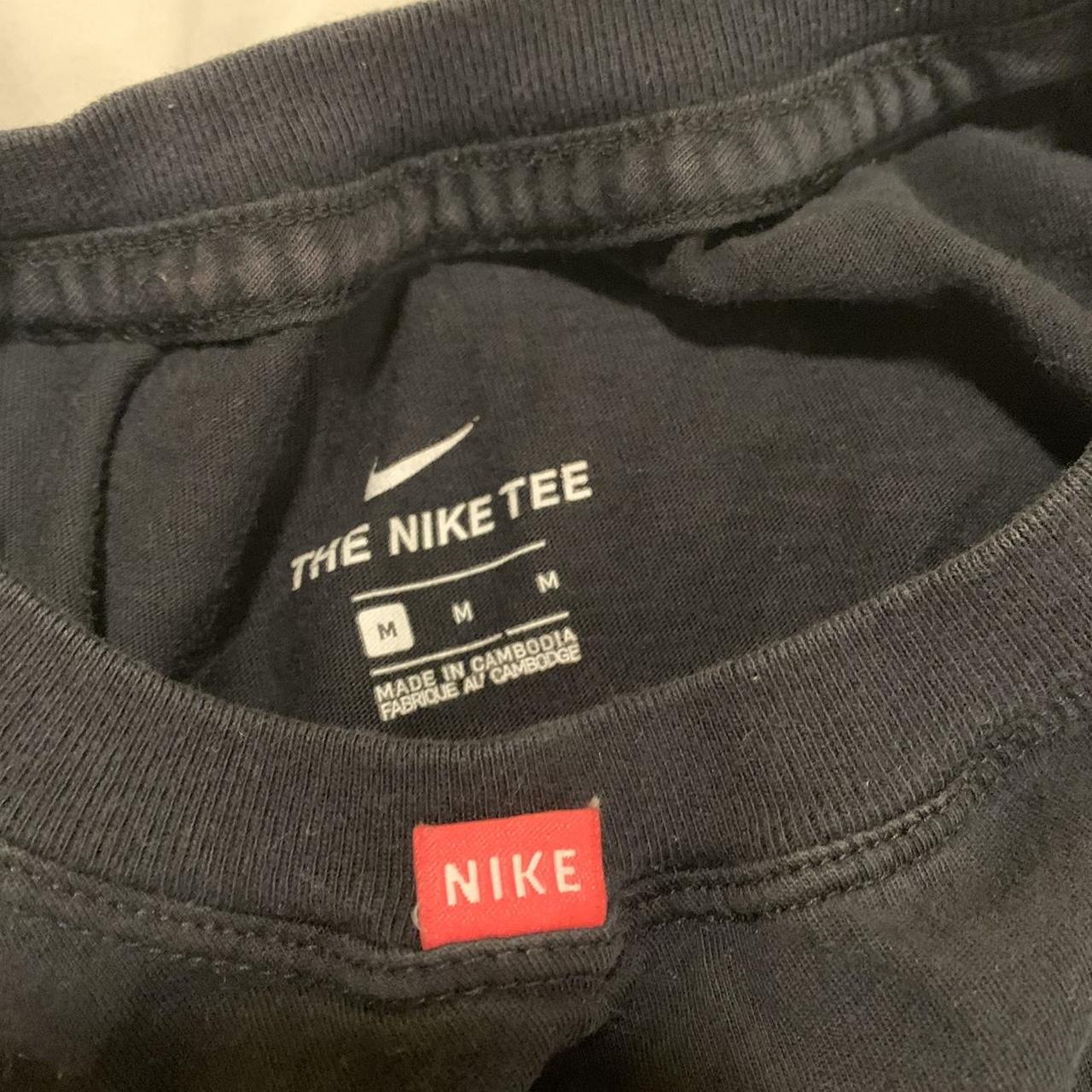 Black world graphic Nike crop top. Size medium.... - Depop