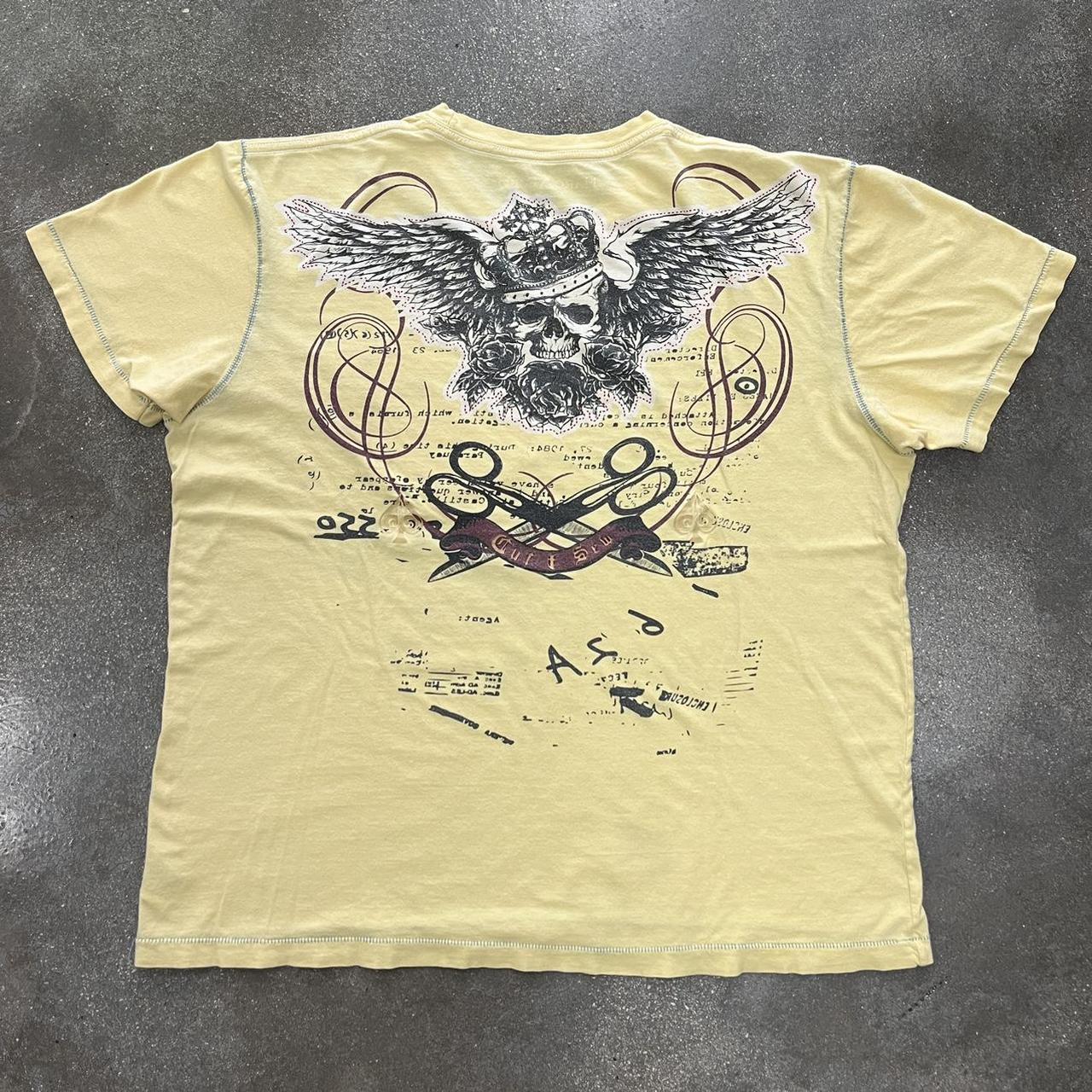 Y2K Marc Ecko Cut & Sewn Winged Skull Yellow Graphic... - Depop
