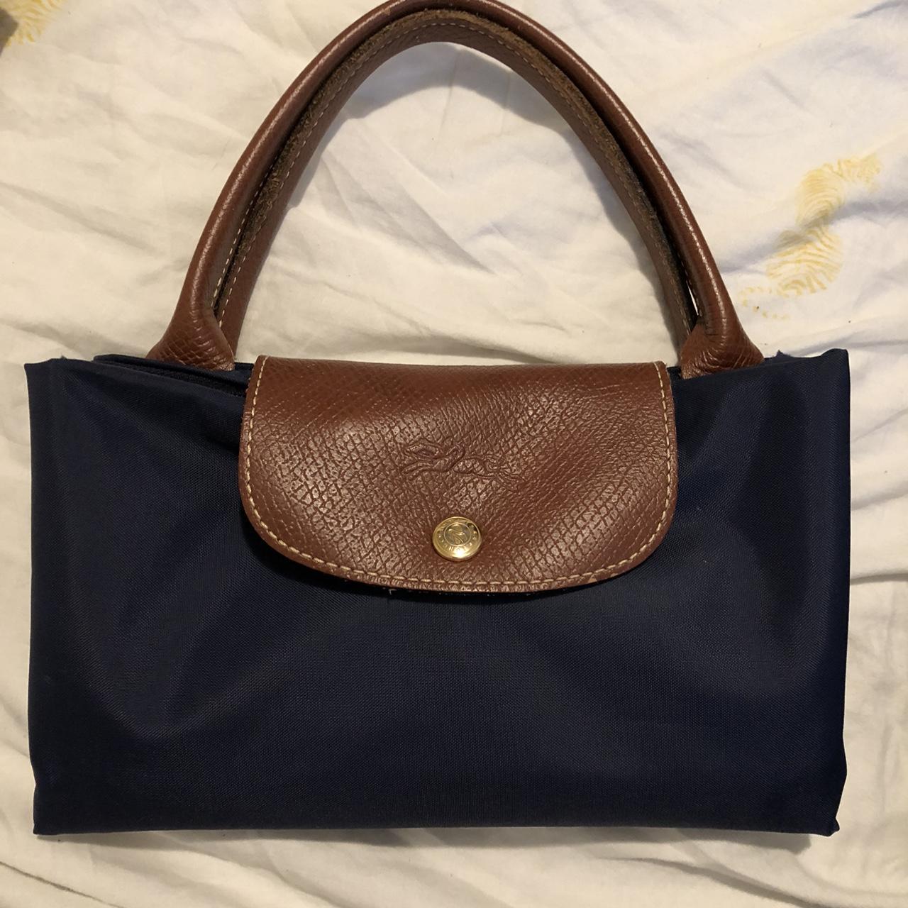 Small navy blue Longchamp bag, worn but in great... - Depop