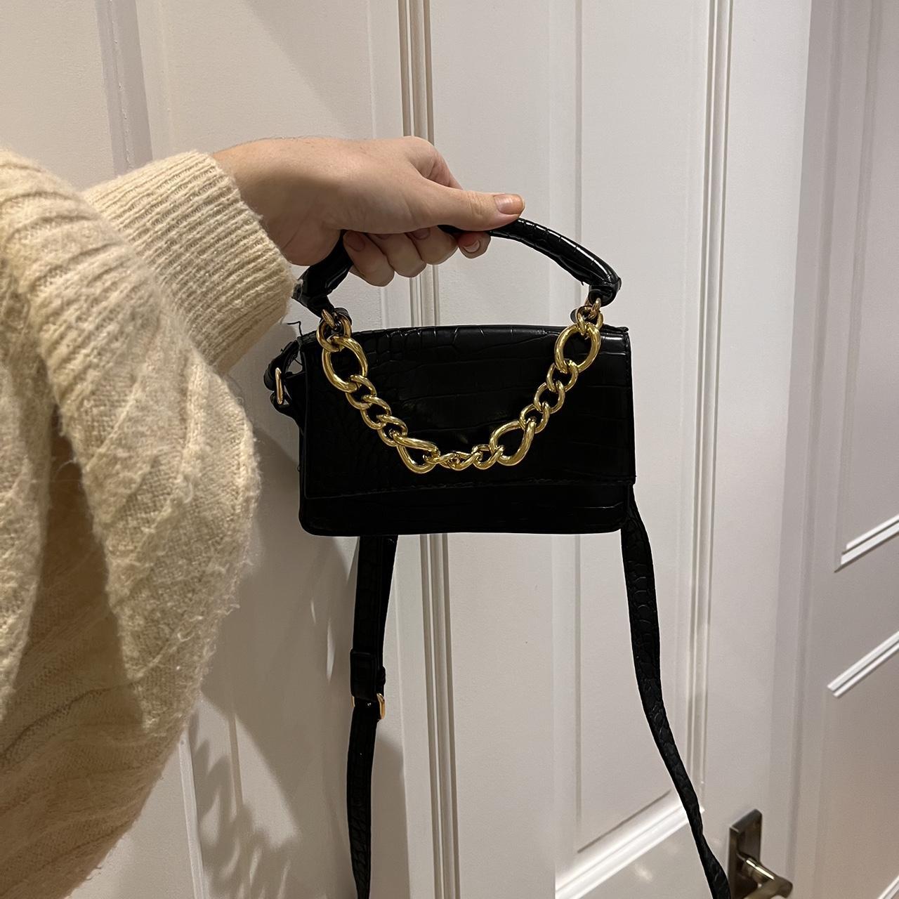 Mini black cross body bag with gold chain. - Depop