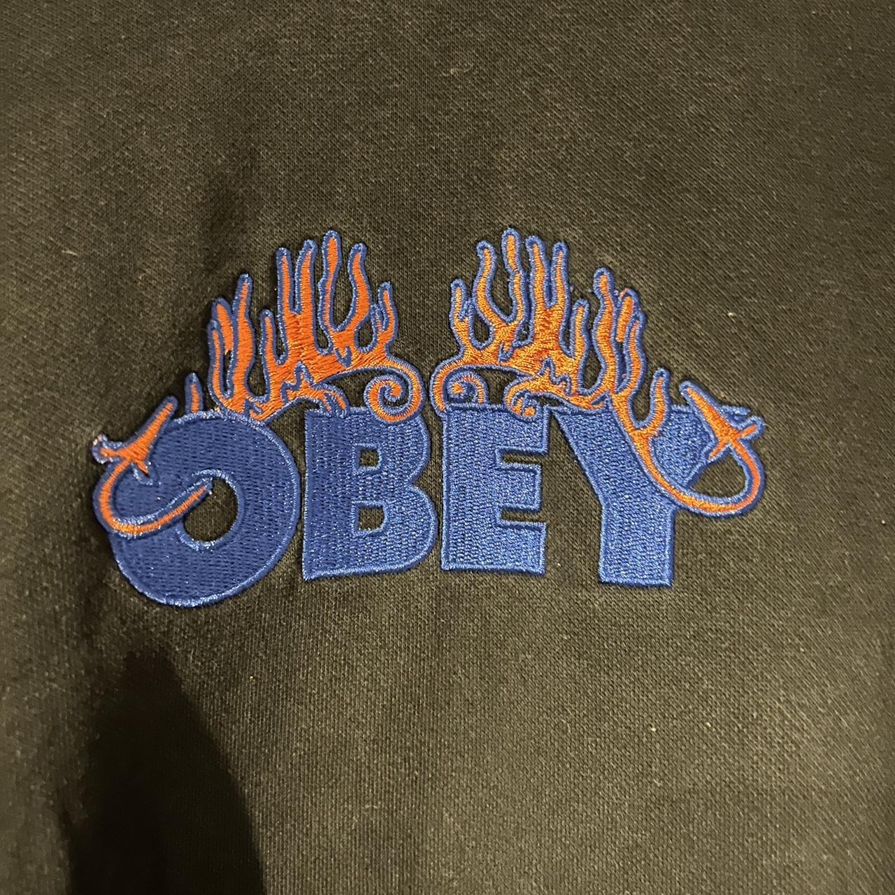 Men’s black obey hoodie with embroidered design.... - Depop