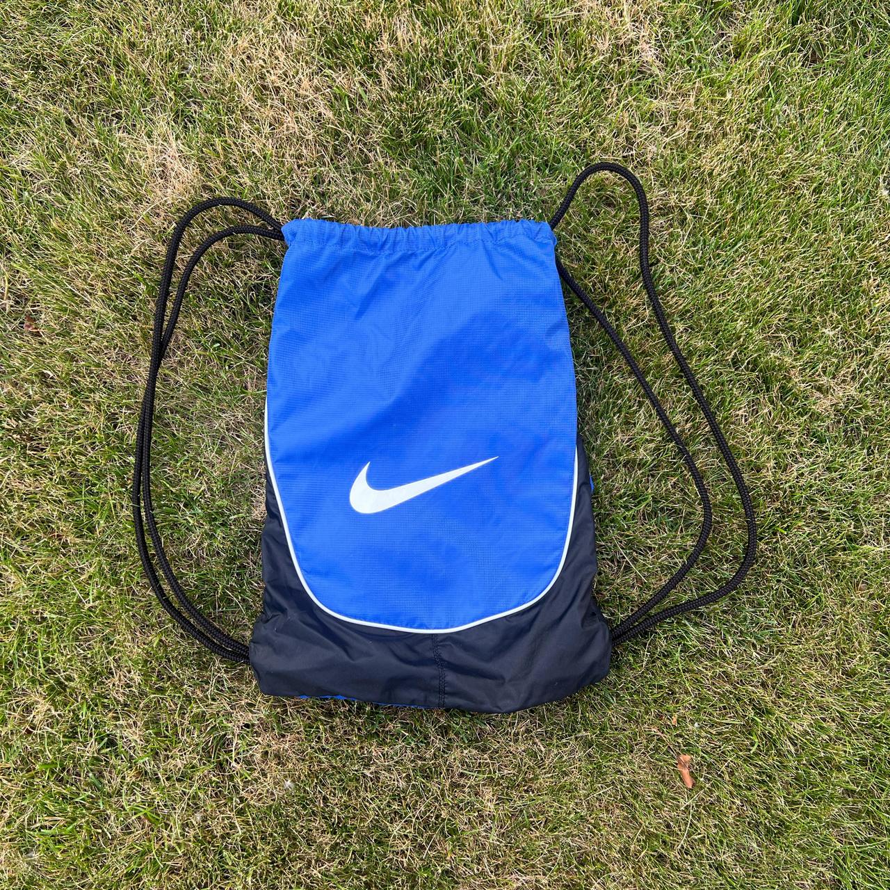 Blue Nike drawstring bag Little dirty on the back - Depop