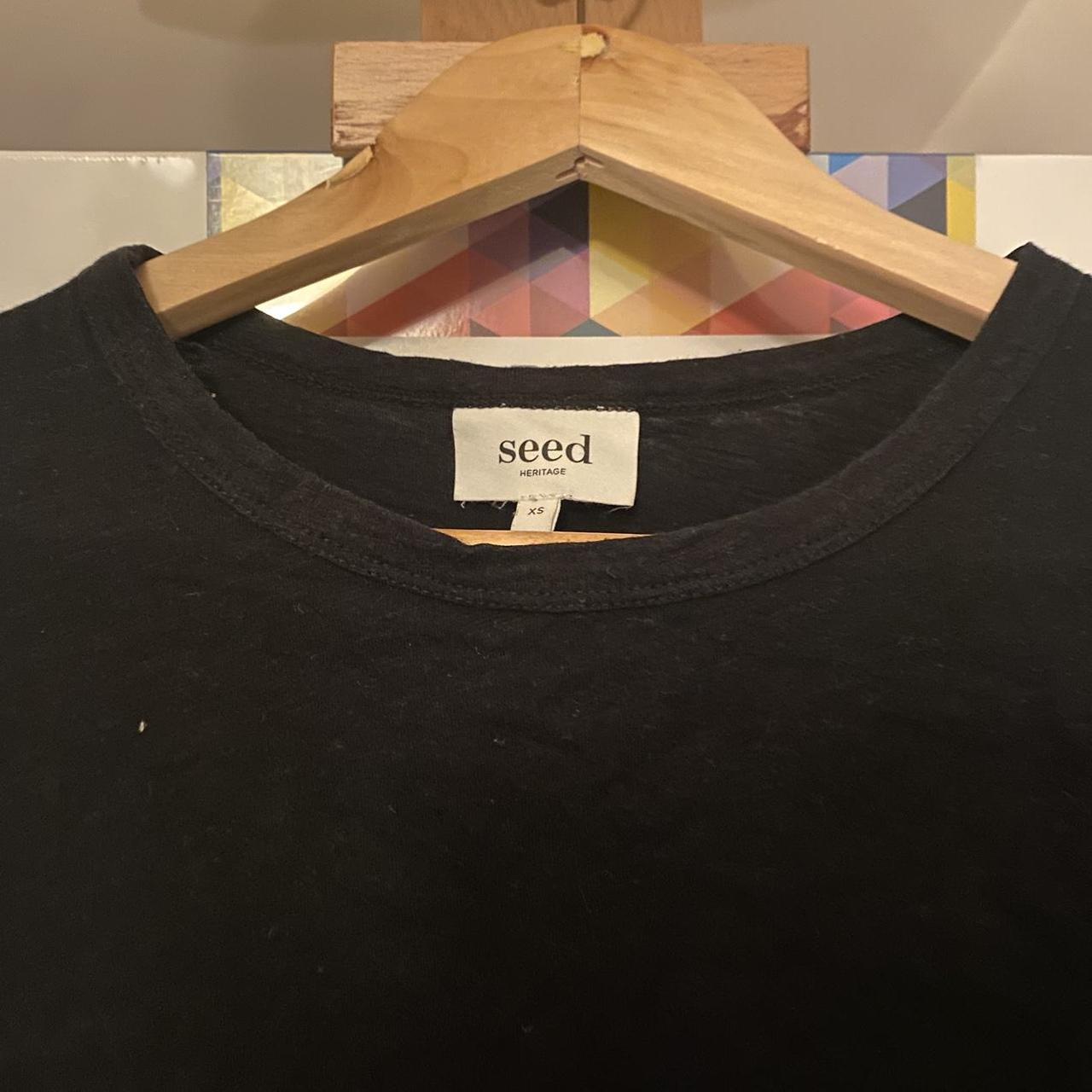 black basic seed heritage tee with scooped bottom - Depop