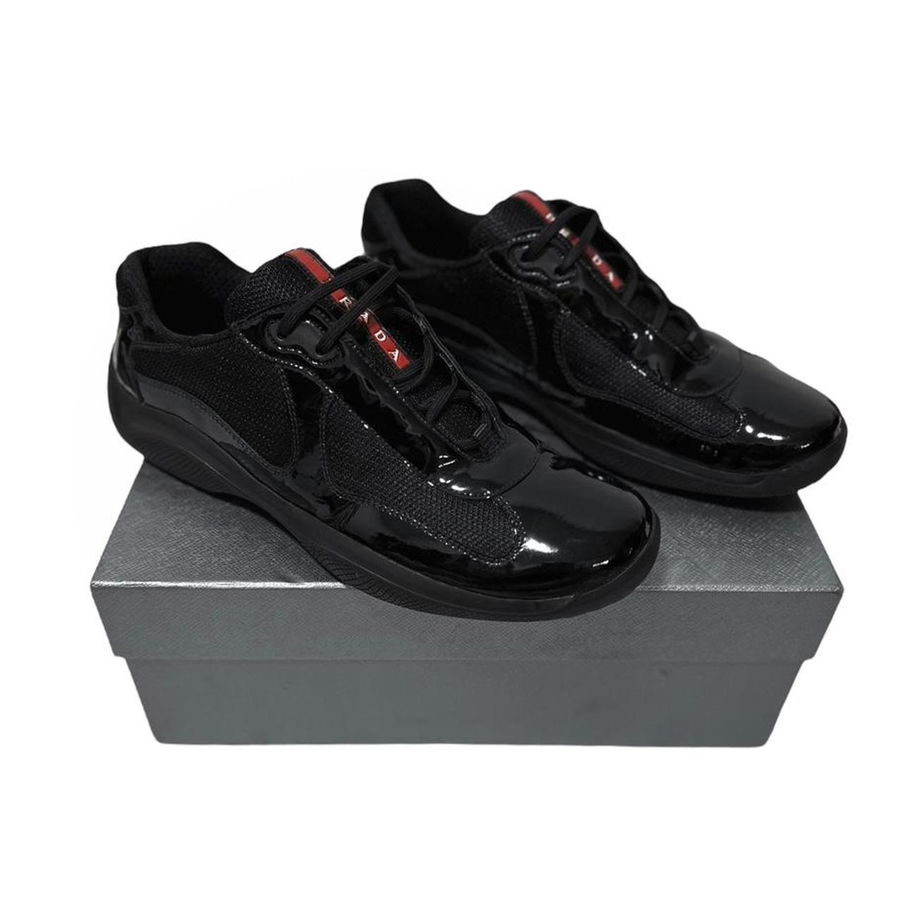Prada America cups black patent leather trainers.... - Depop