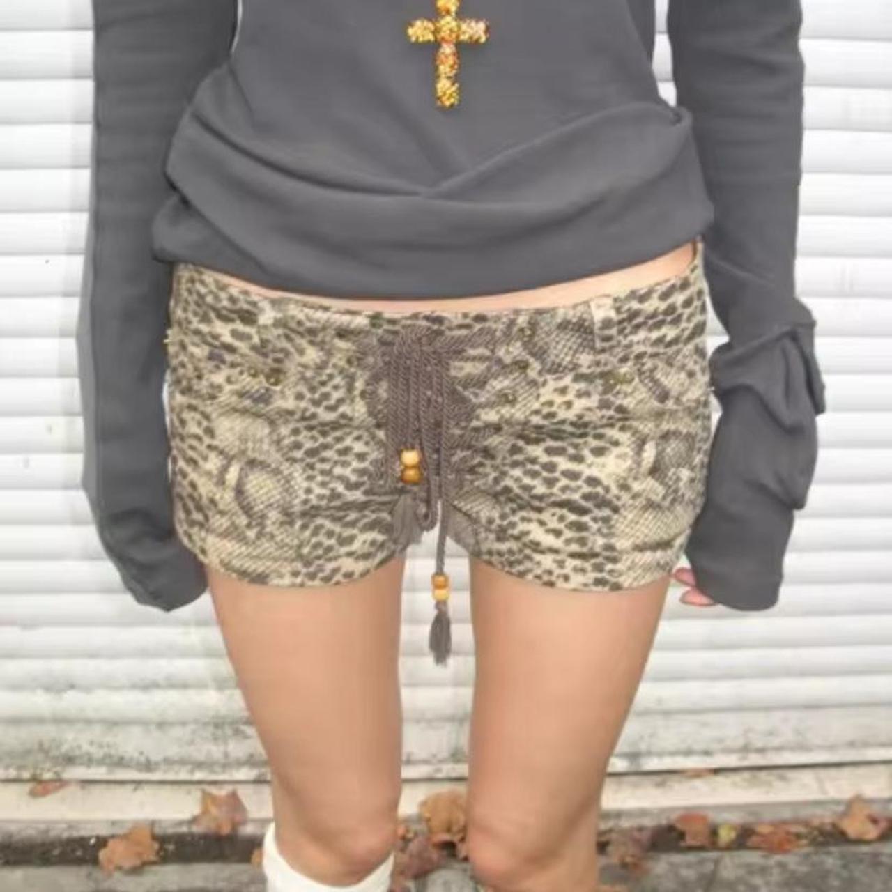 Low waisted snake print shorts with a drawstring... - Depop