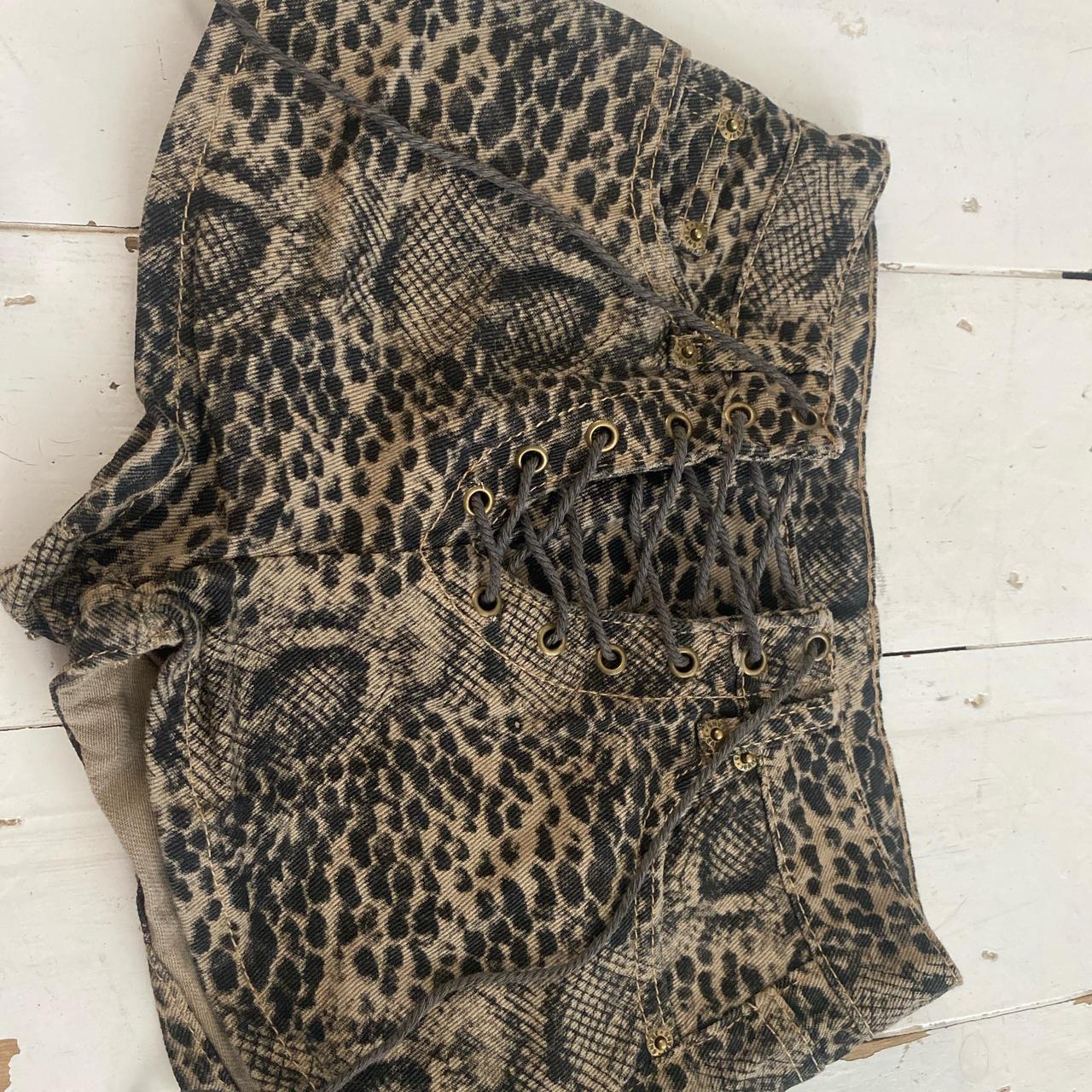 Low waisted snake print shorts with a drawstring... - Depop