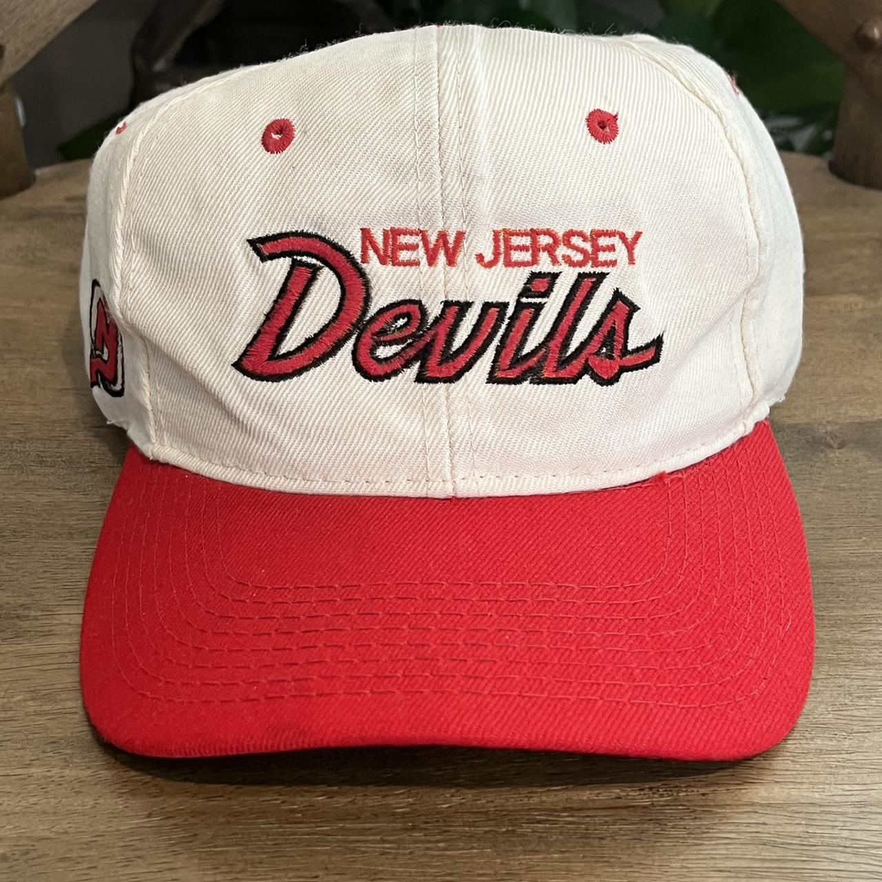 Item - Vintage 90s New Jersey Devils SnapBack Script... - Depop