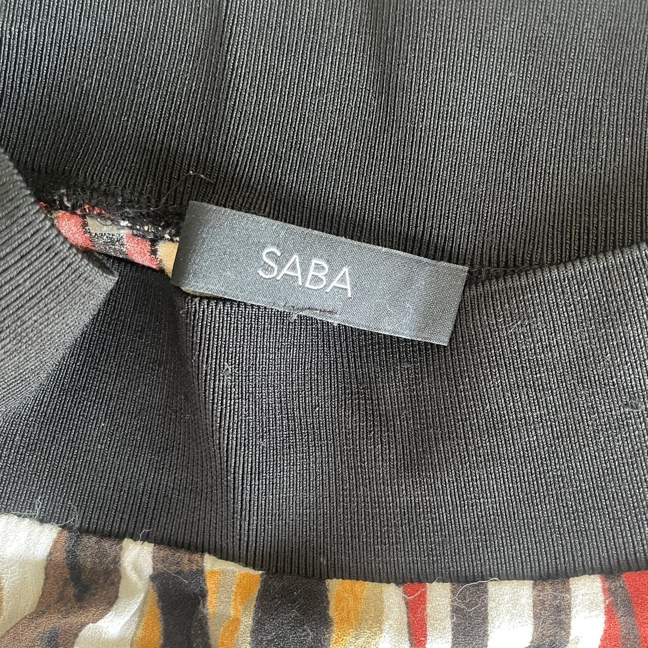 Incredible vintage Saba Asymmetrical pattern low... - Depop