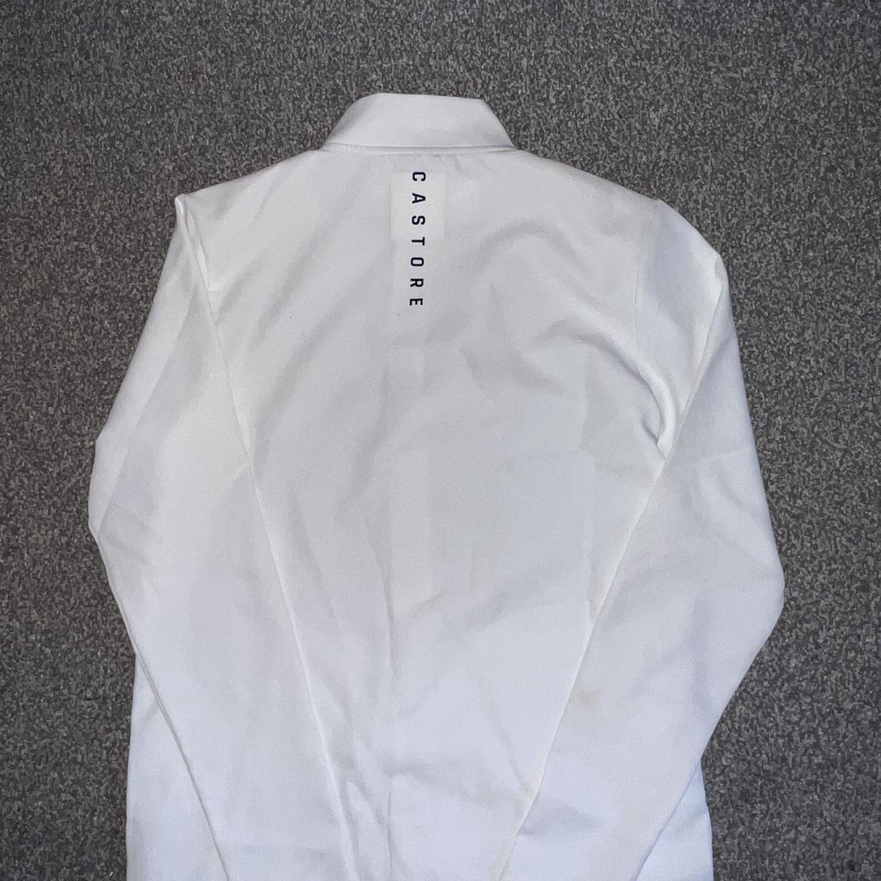 White Castore anthem jacket size small Excellent... - Depop