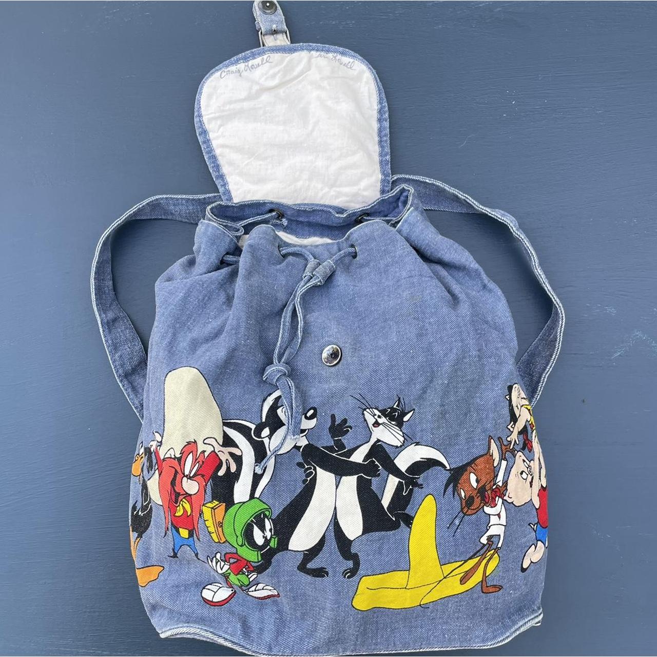 Vintage 90s Looney Tunes denim backpack dated 1993... - Depop
