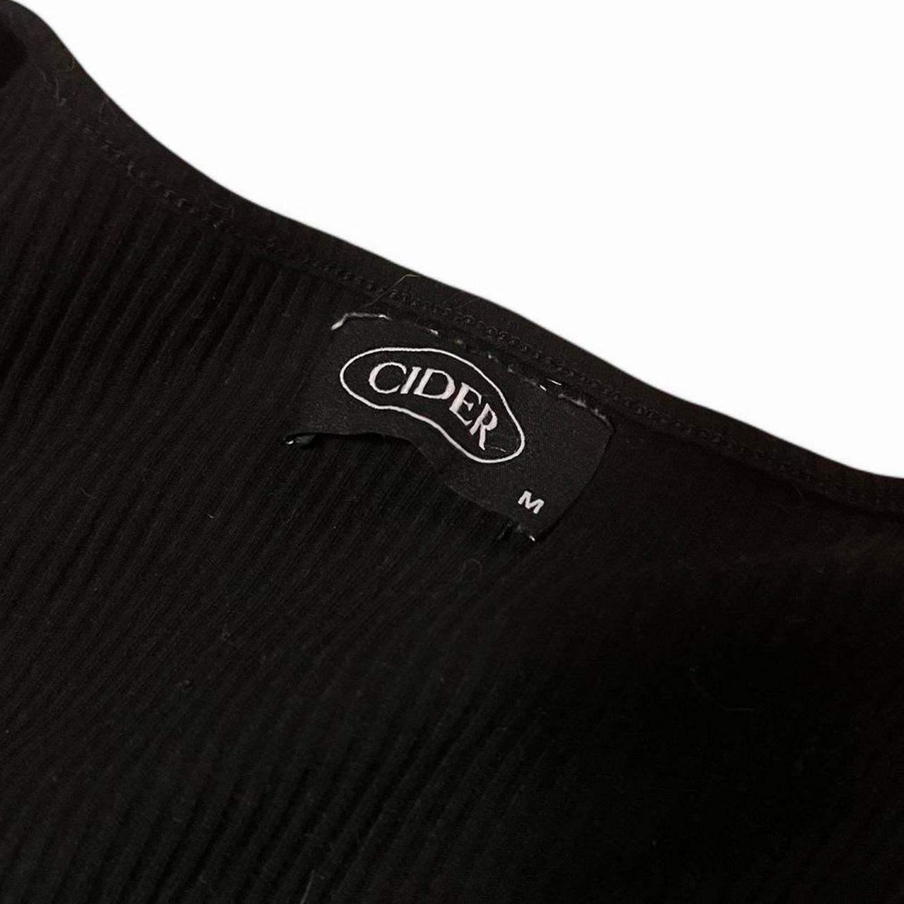 Black Cider tank top with cut-out detail with safety... | Depop